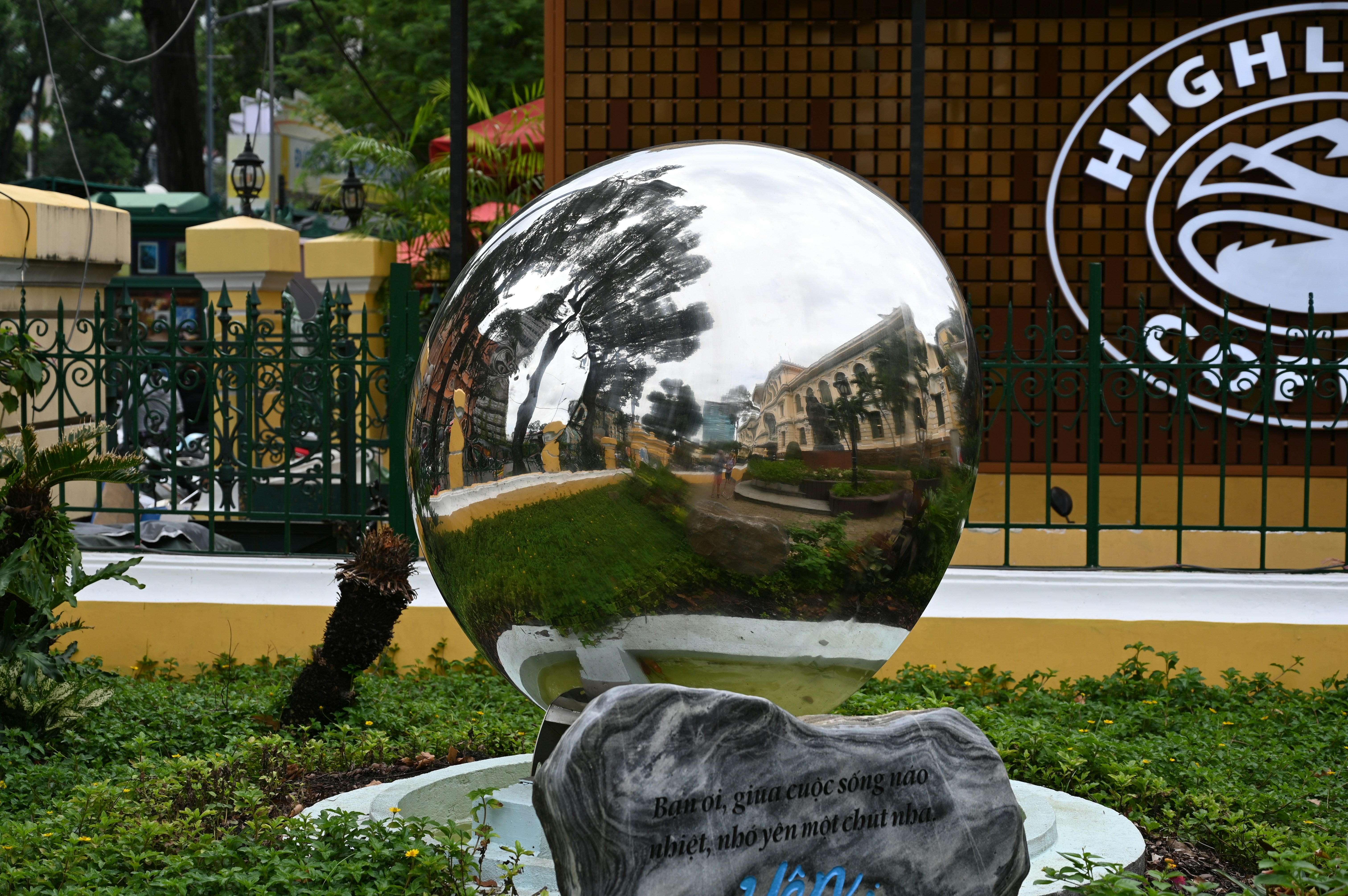 Reflected Lane: A Glimmering Sphere in a Courtyard