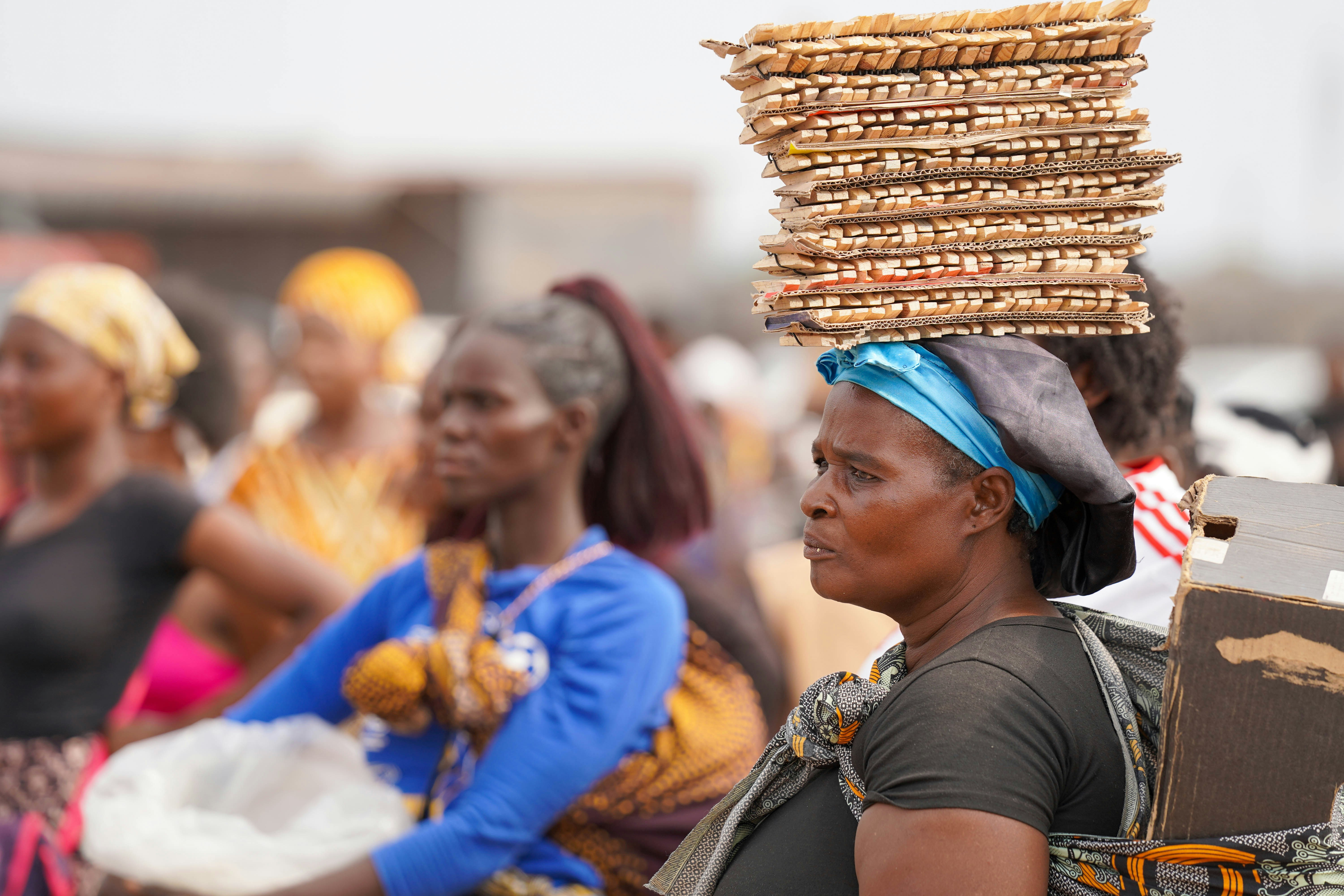 Balancing Burden: A Vendor Under Stacked Baskets