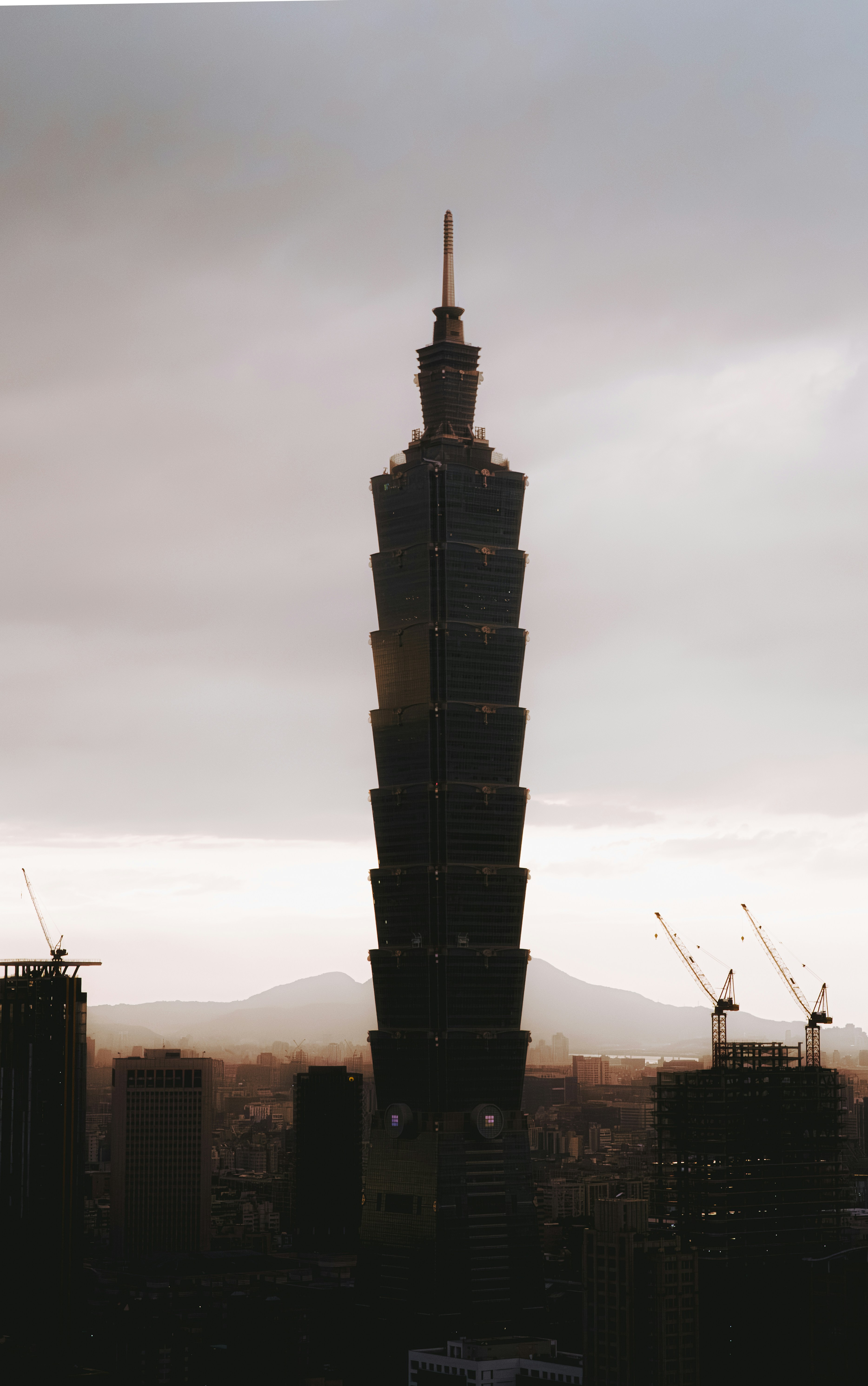 Rising Sentinel: Taipei 101 Against a Dappled Sky