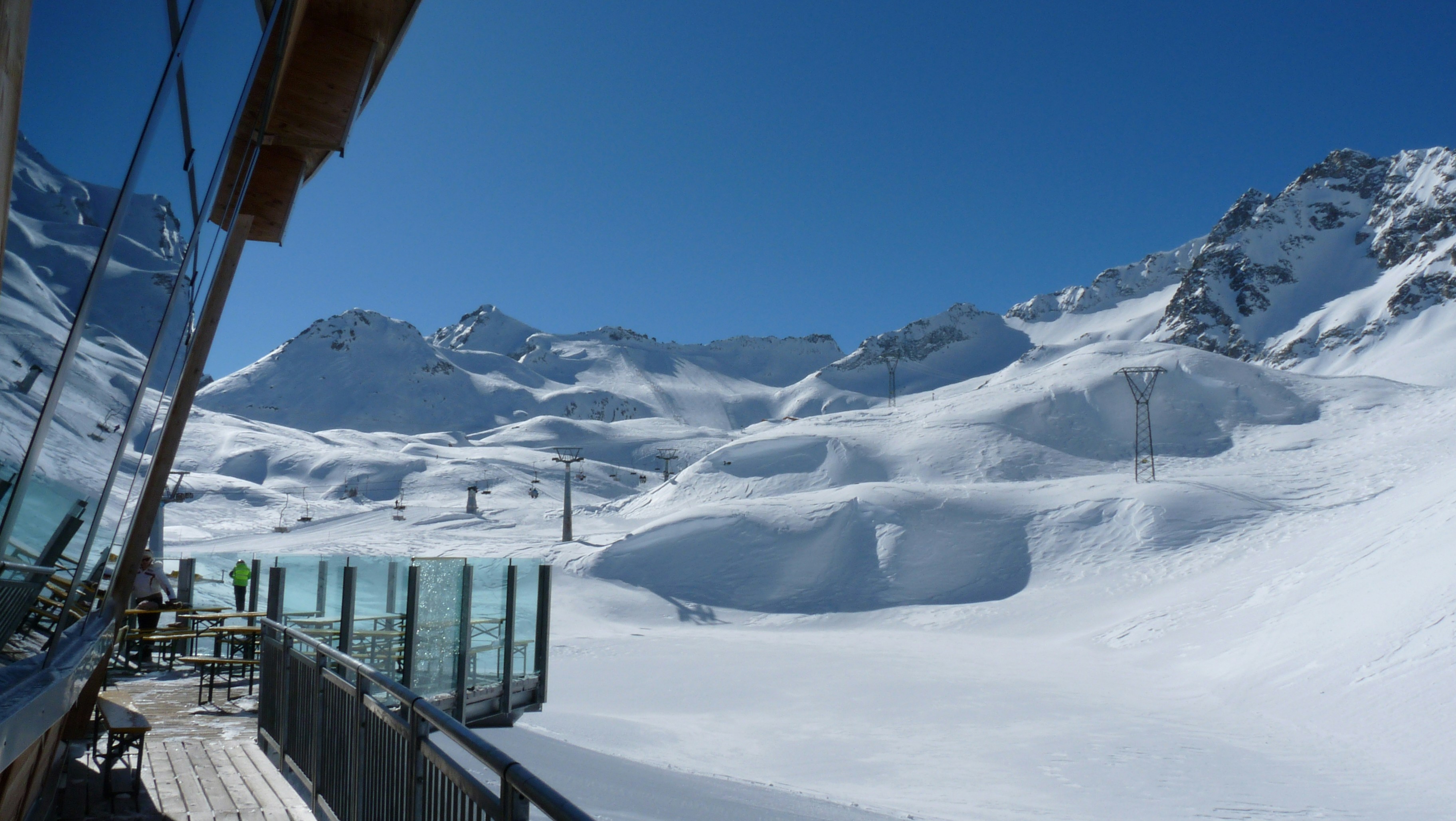 Alpine Snowfields from a Cabin Deck