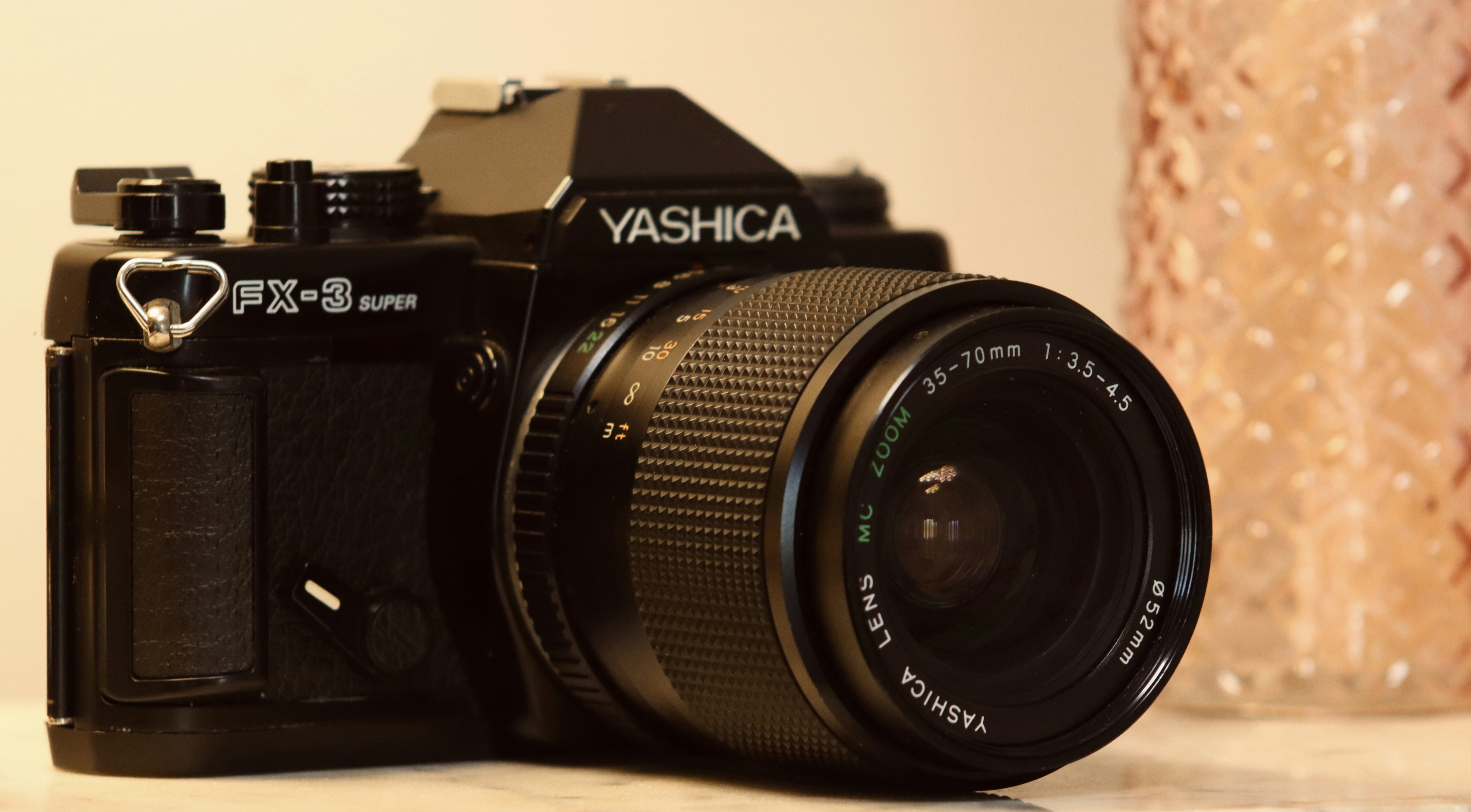 Vintage Yashica with a 50-70mm Prime: A Quiet Camera Resting on a Wooden Surface