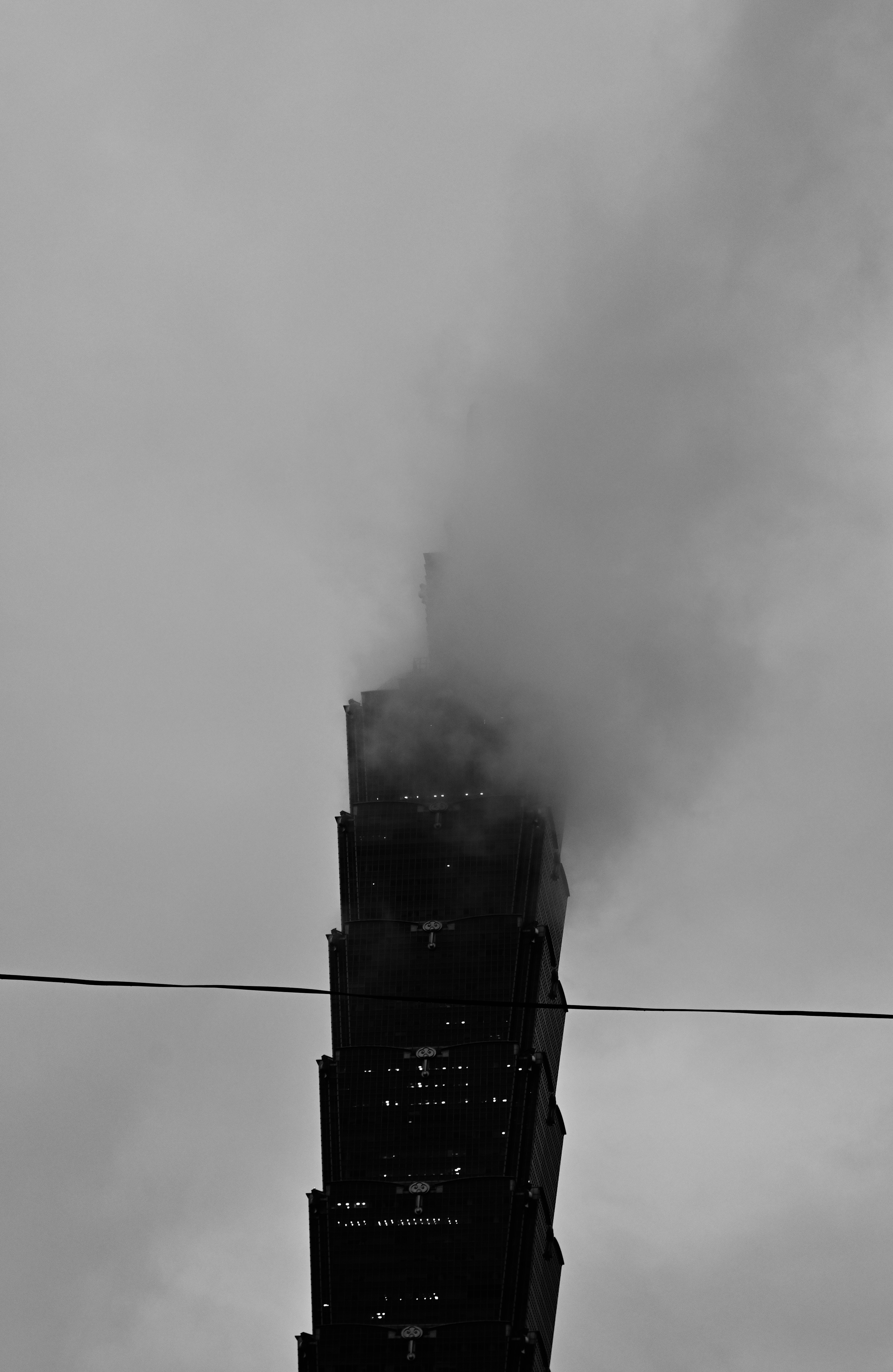 Smokestack Ascend: A Tower Embraced by Cloud