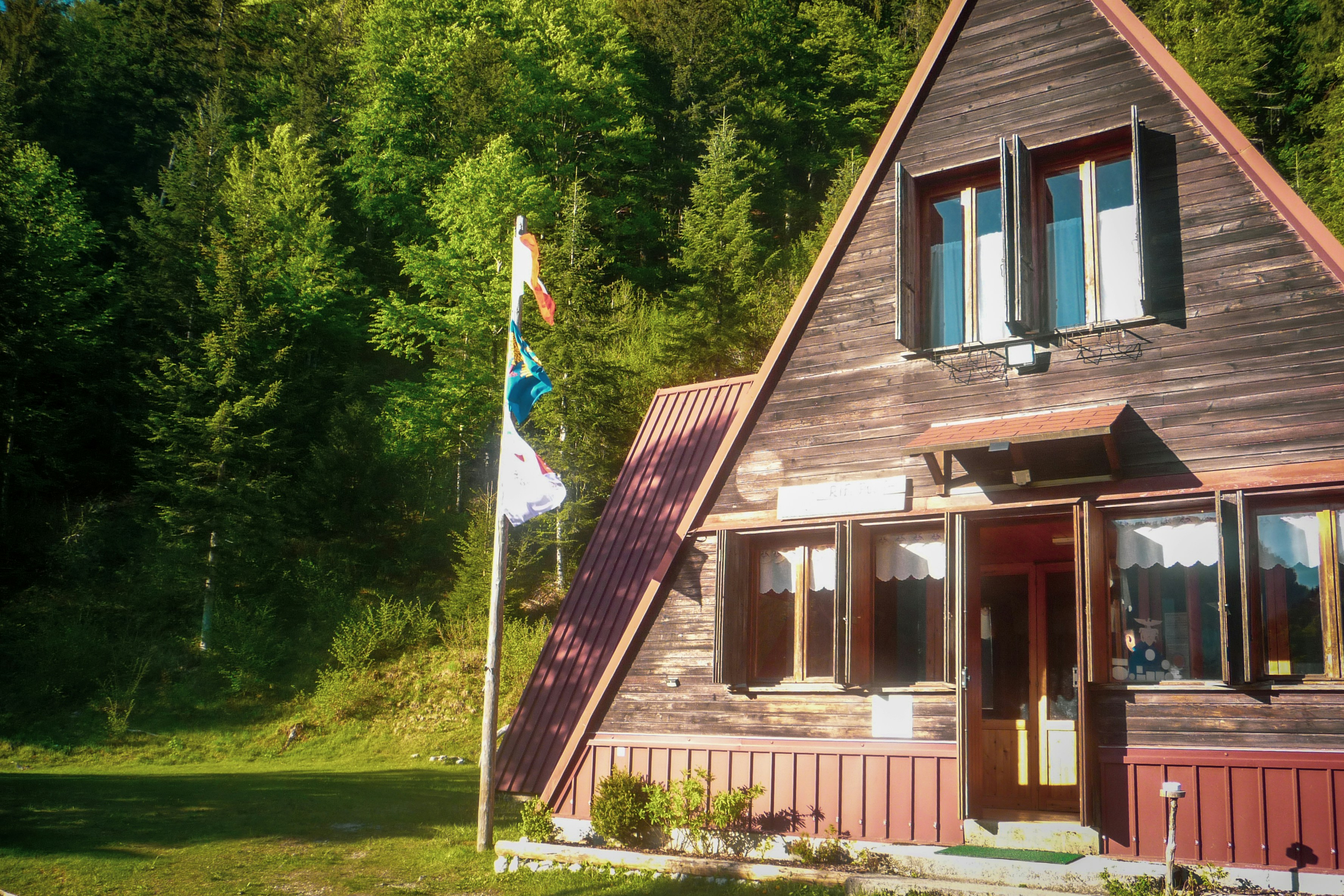 Rustic A-frame Lodge Quietly Reaches Toward the Pines