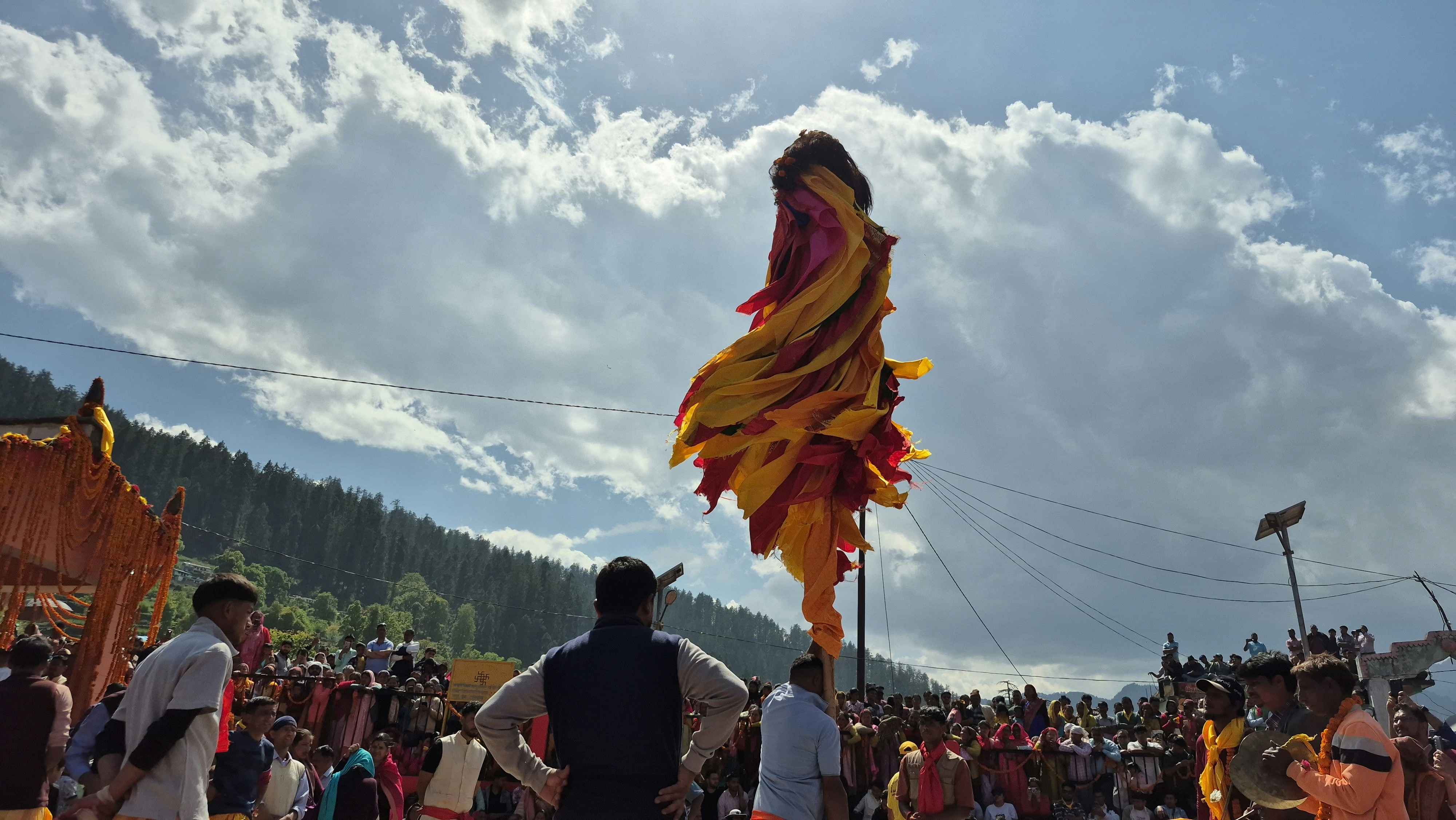 Festival Flag Dance Above a Sea of Onlookers