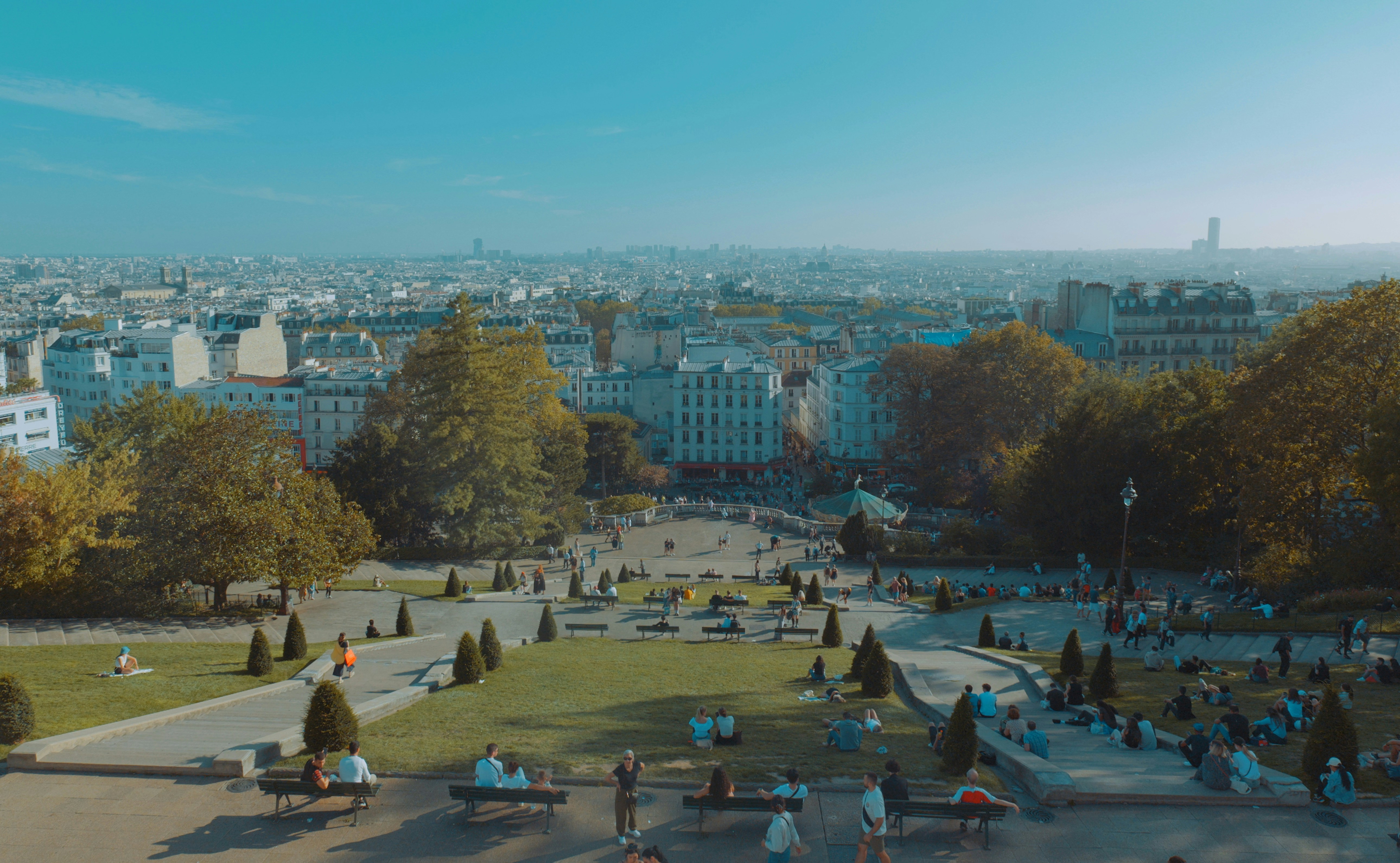 City Park Terrace: People, Pathways, and Autumn Trees