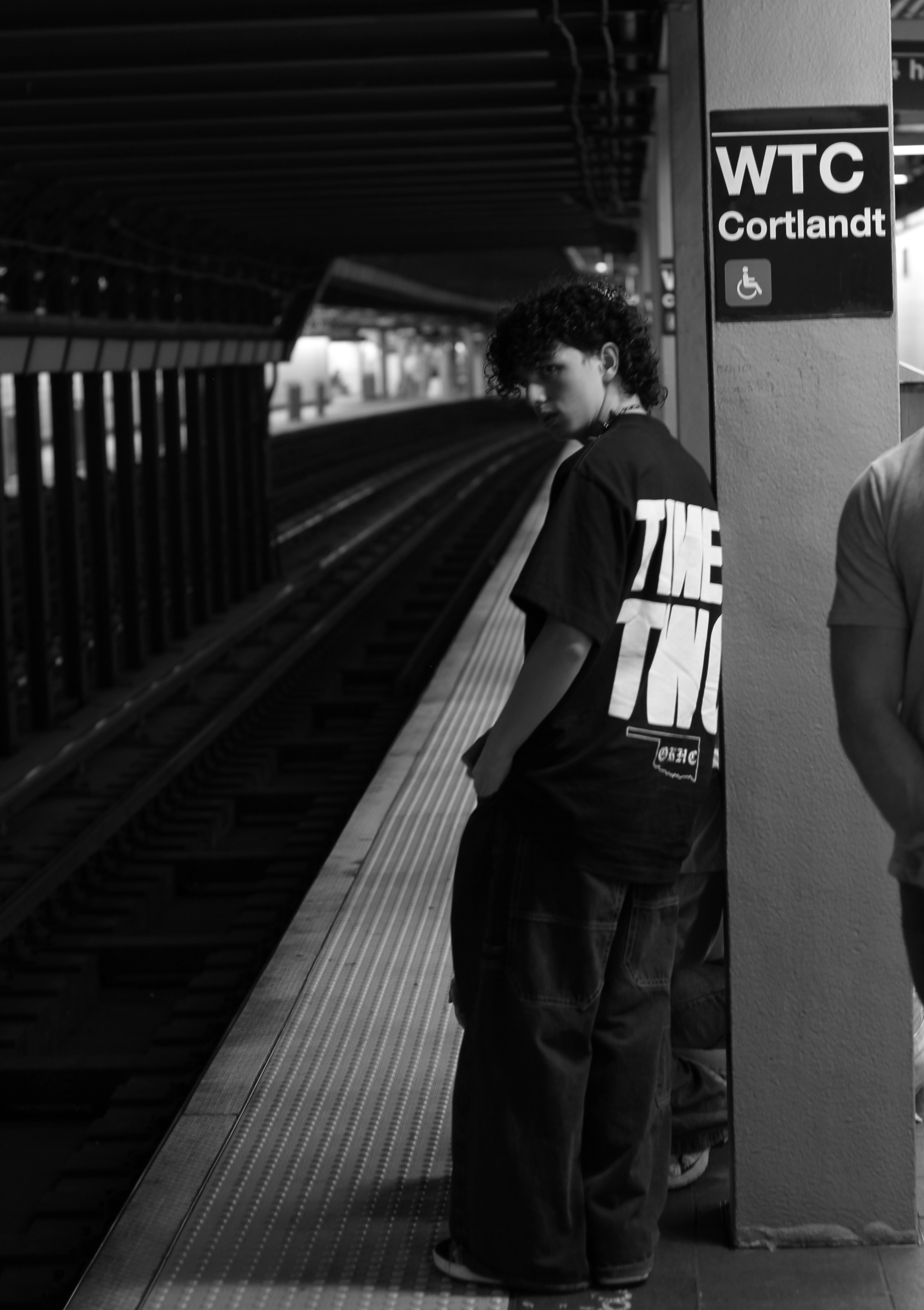Mid-Platform Gaze: A Quiet Moment in the Subway Ritual