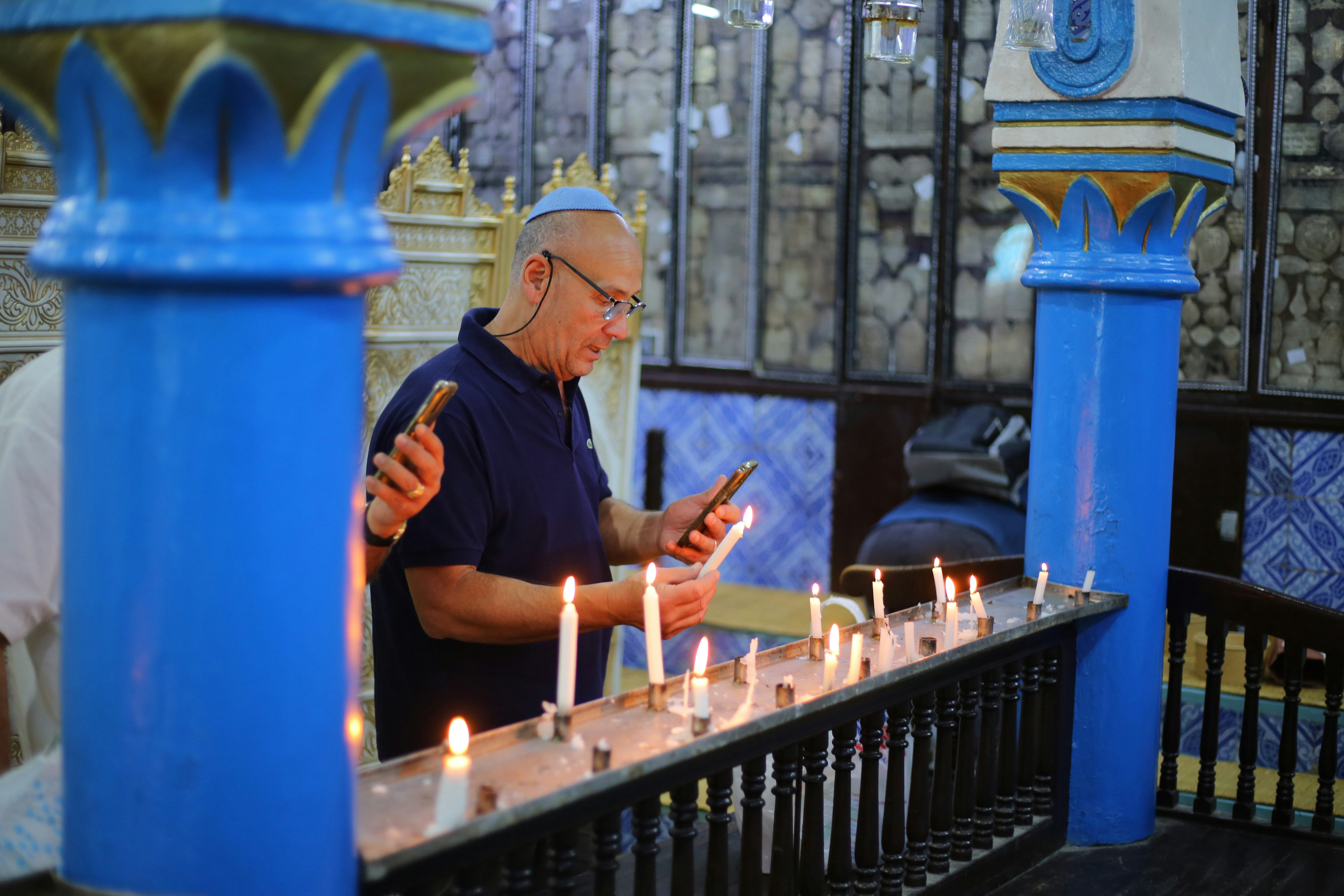 Candles and Concentration: A Visitor in a Blue-Mwashed Shrine