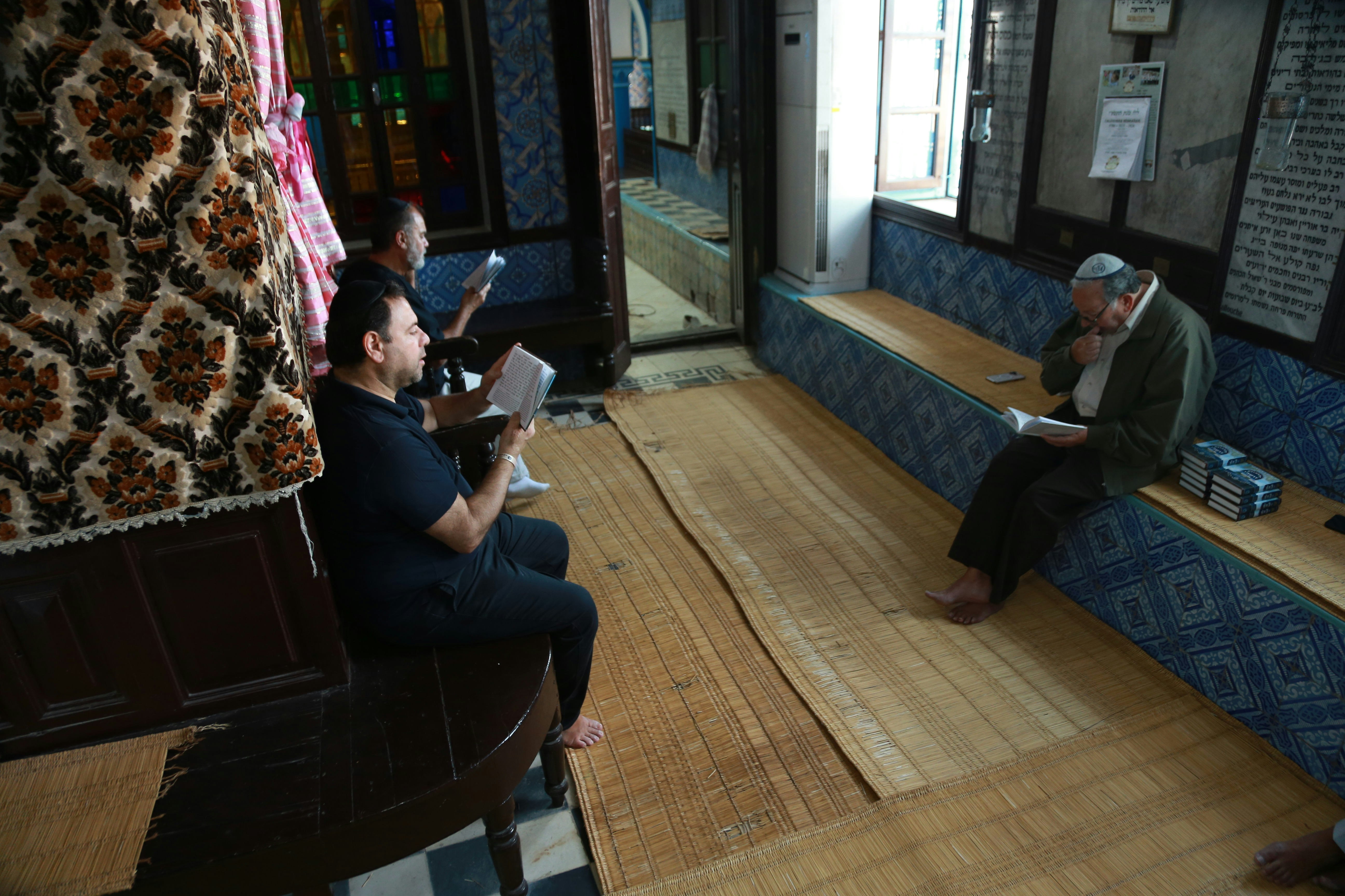 Quiet Congregation: An Elder Reads in a Sunlit Prayer Nook