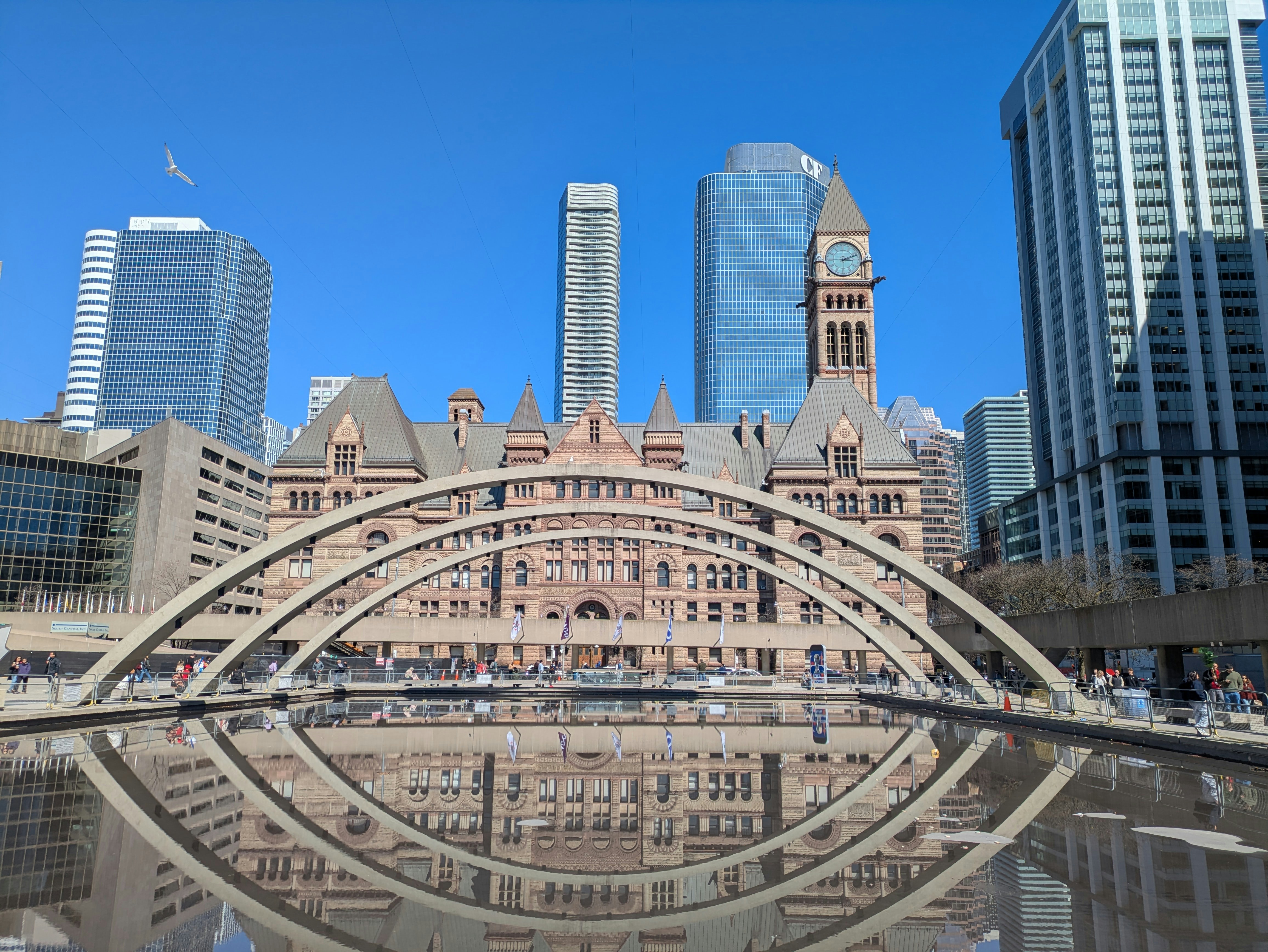 Cityscape in Equilibrium: Arch Reflections and Glass Towers