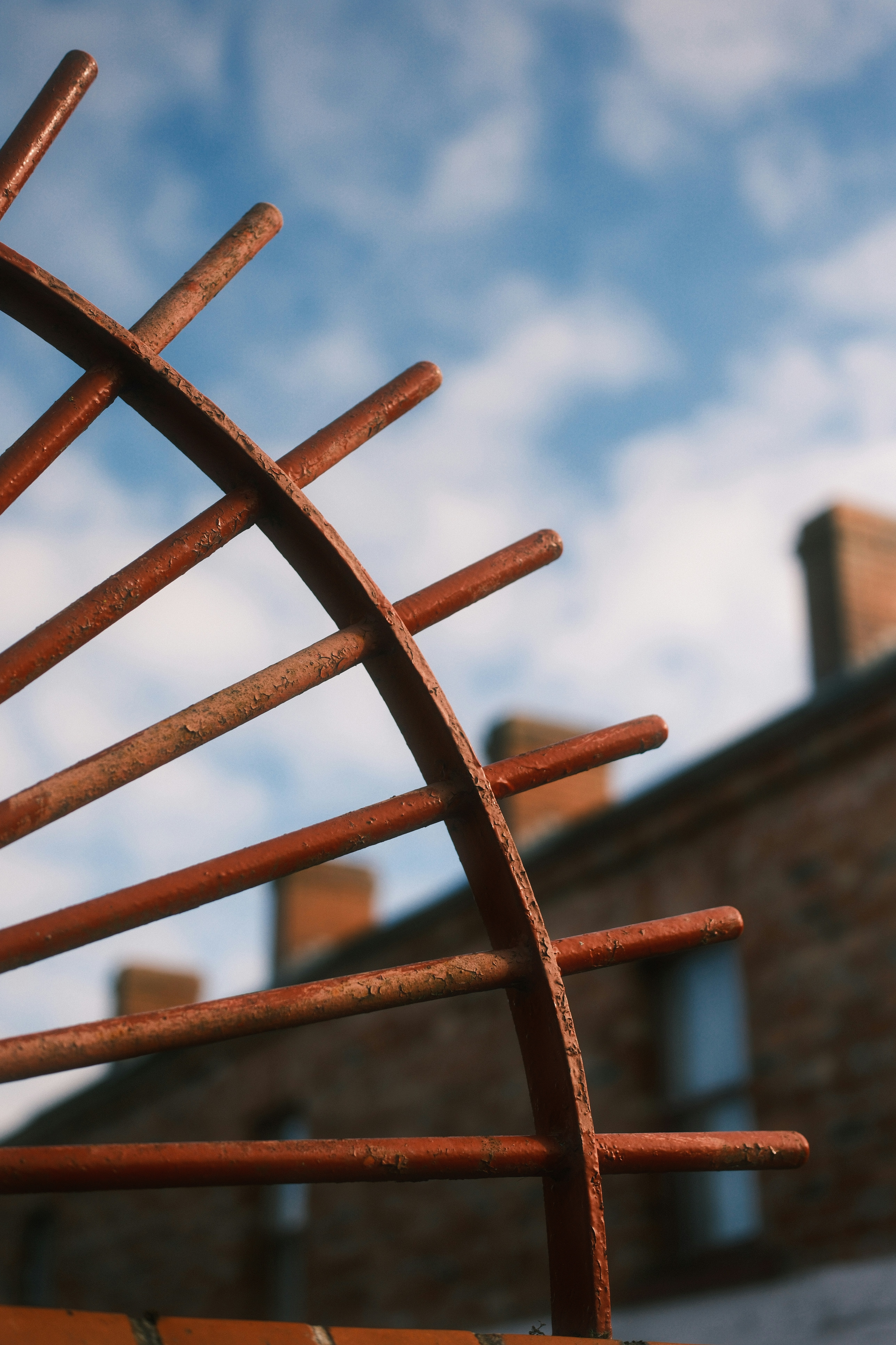 Rusted Arch of Silence Against a Sky of Brisk Blue