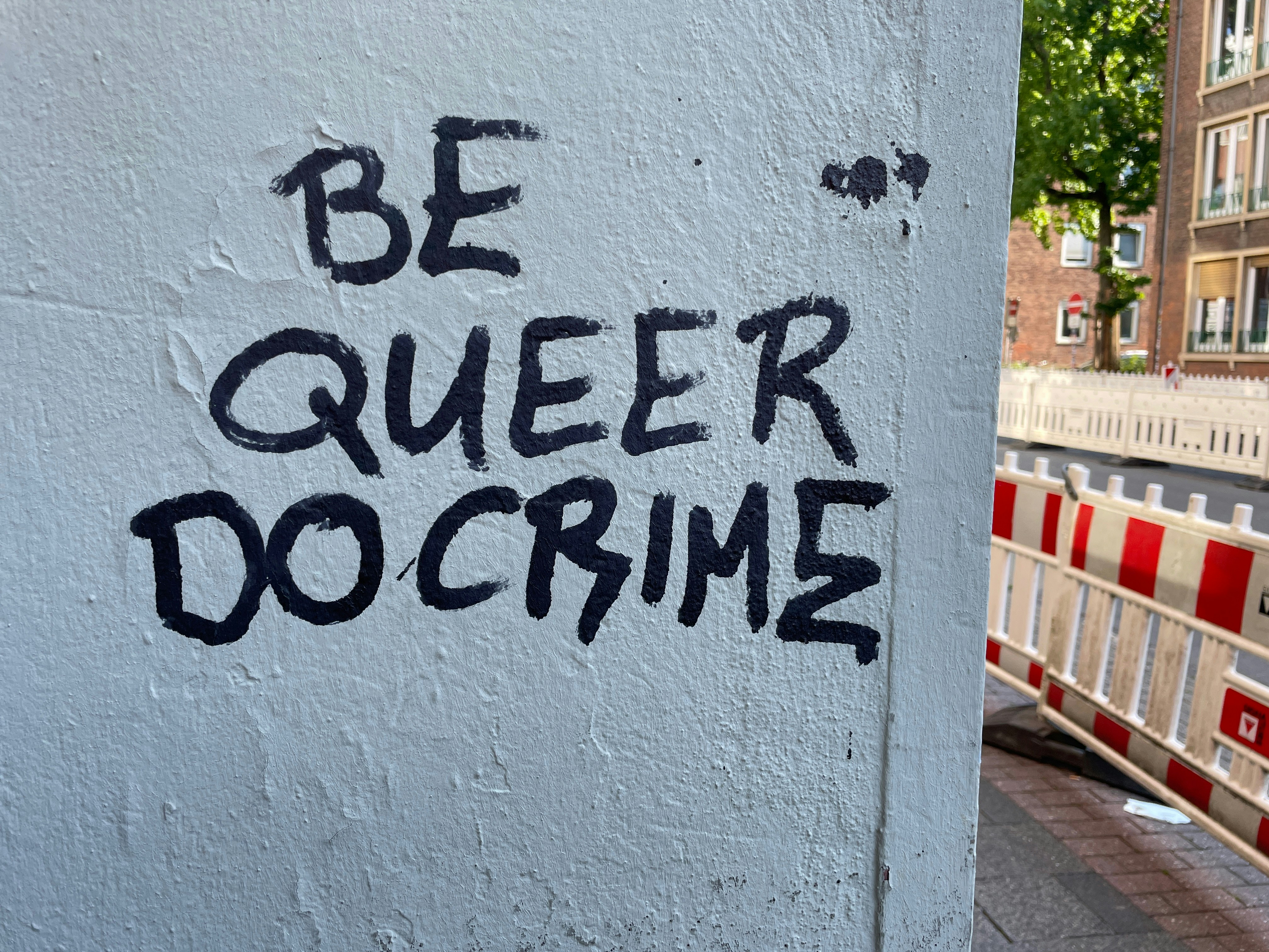 BeQueer Do Crime on a Concrete Wall