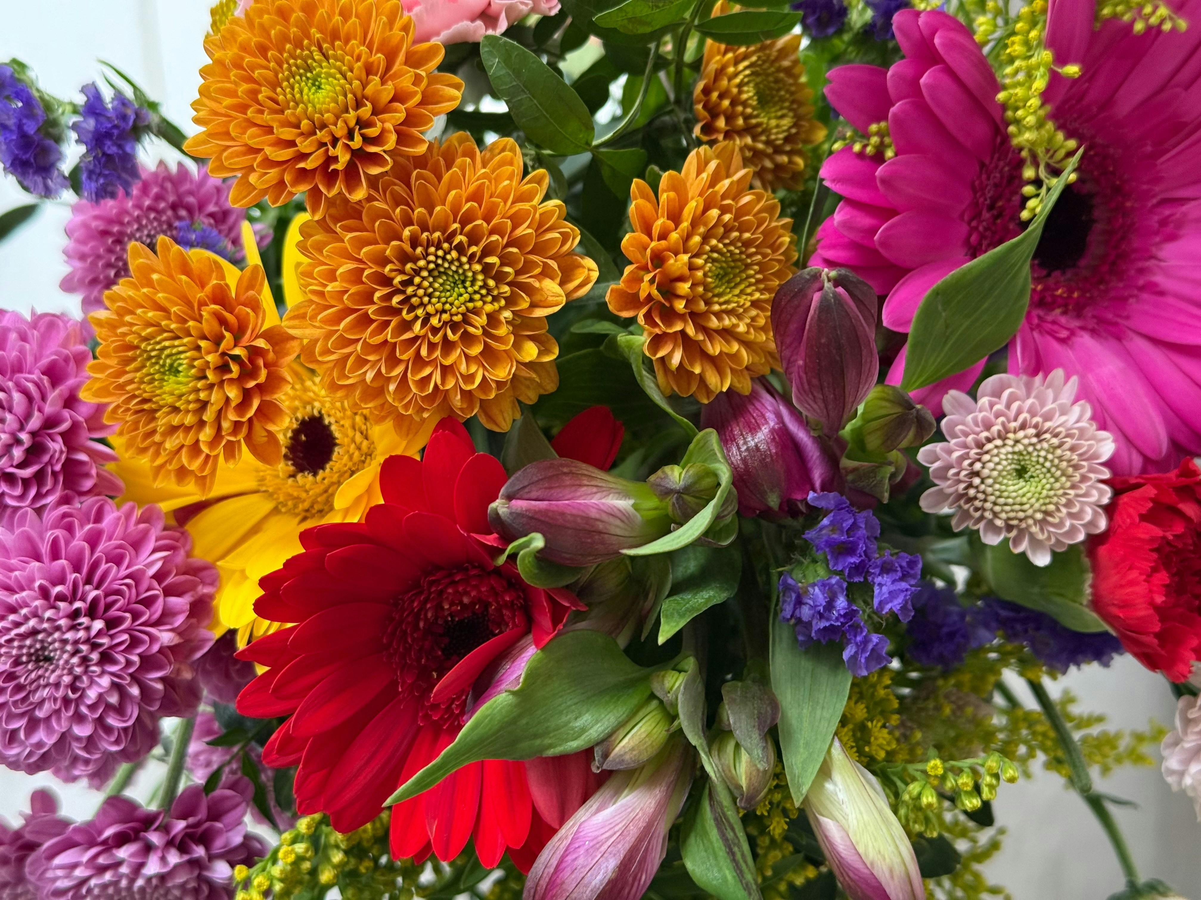 Vivid Bouquet: A Burst of Autumn Hues in Confetti of Blooms