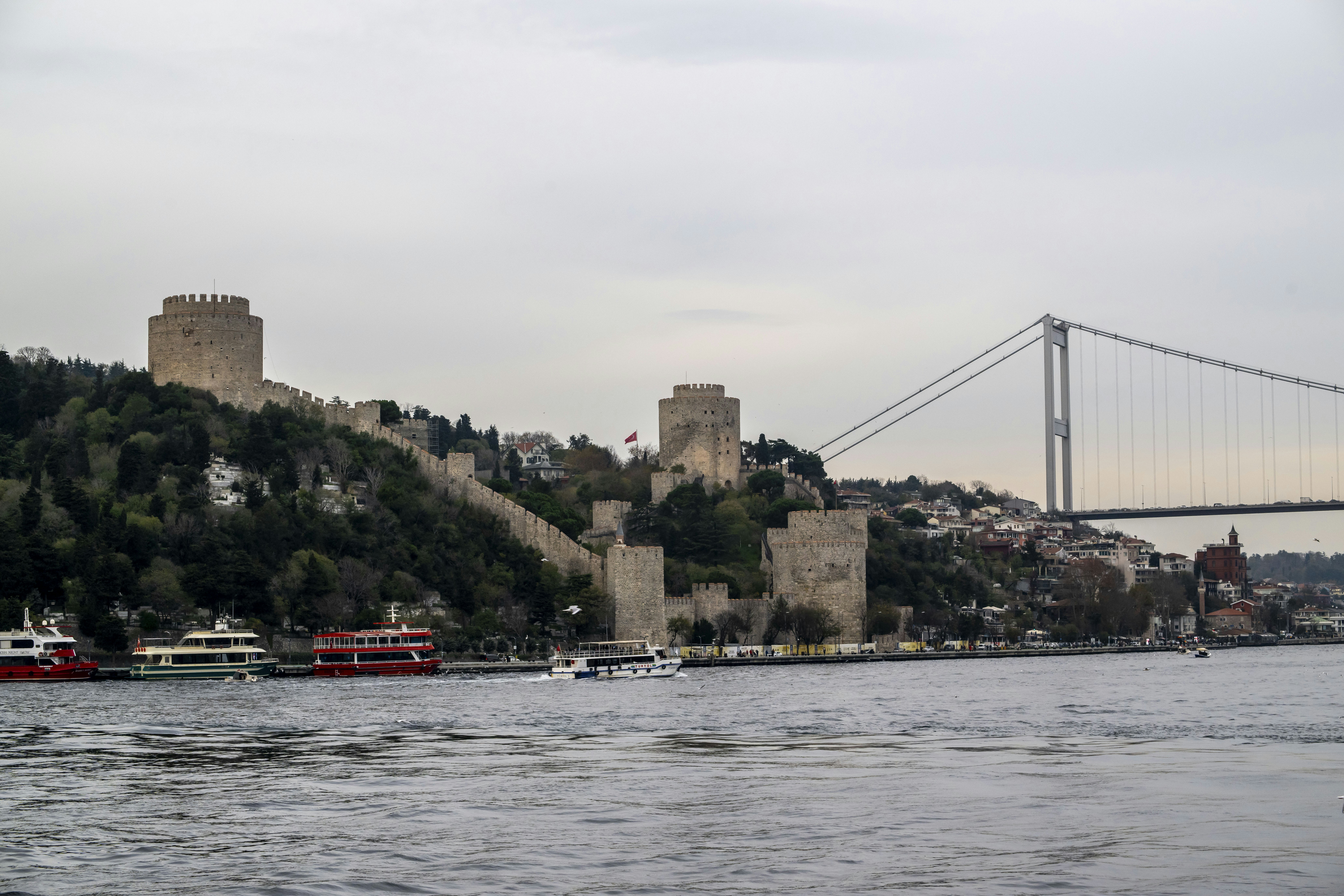 Rising Forts and a Cable-Guarded Skyline Over the Water
