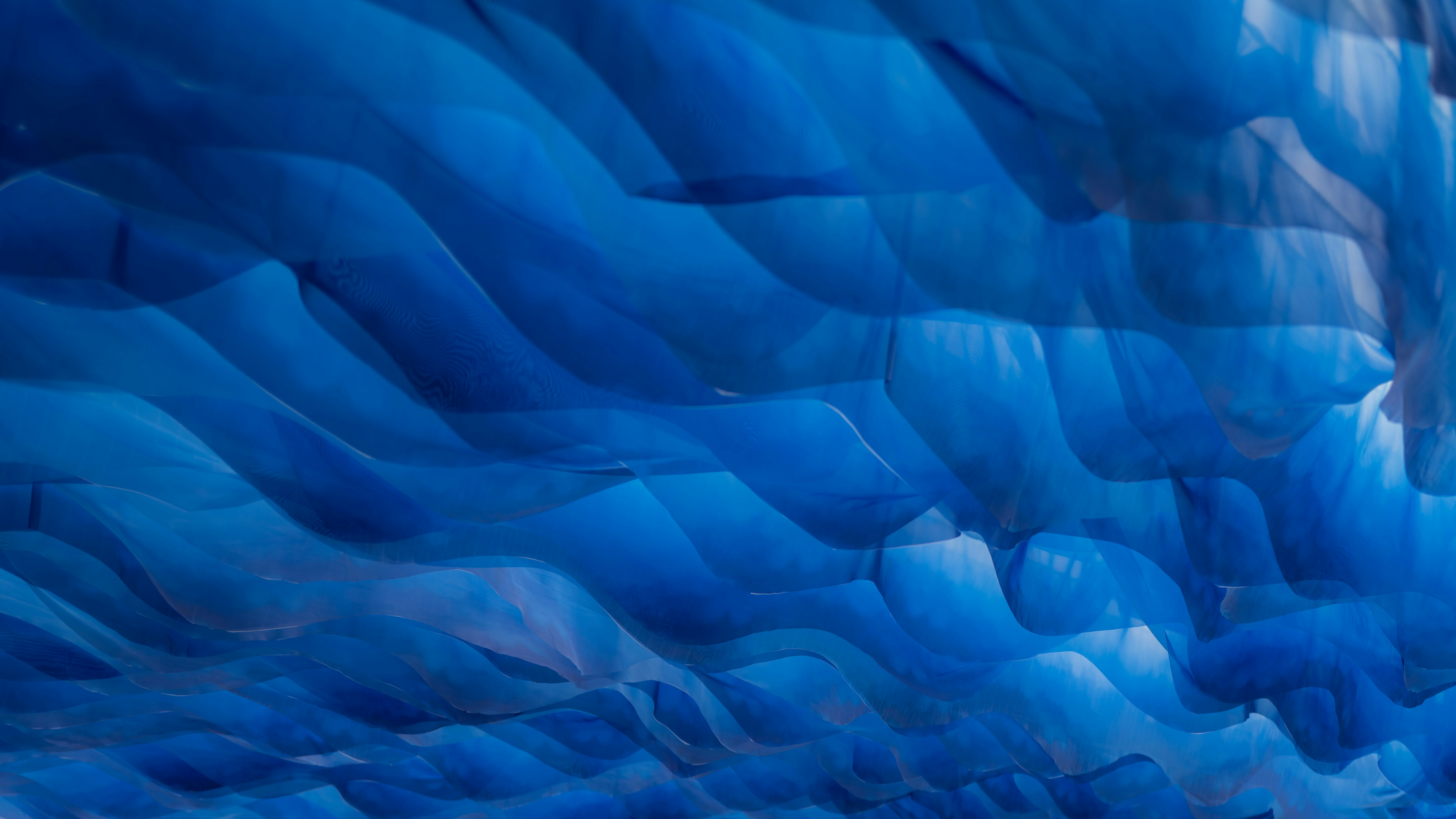 Waves of ultramarine: abstract blue fabric folds
