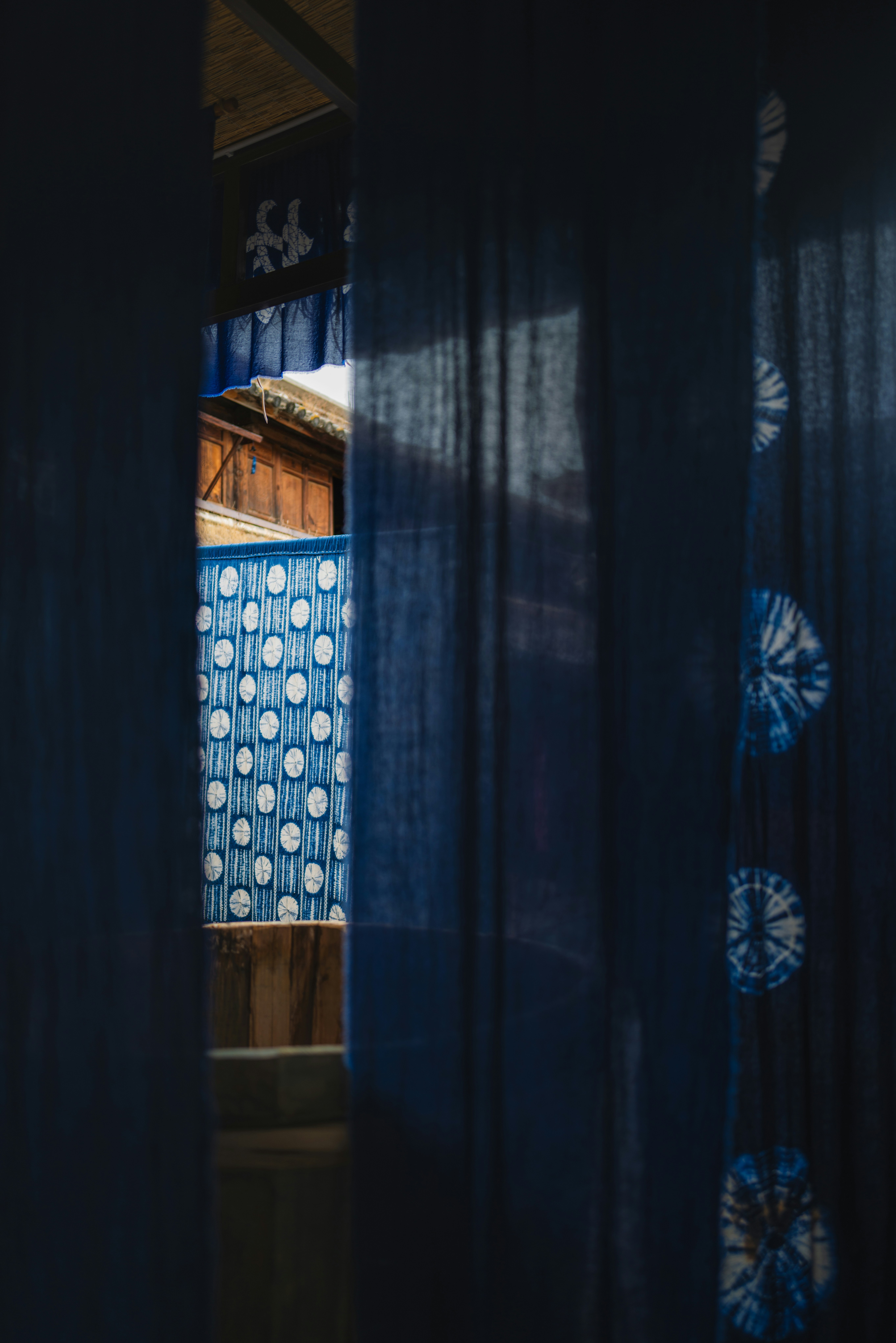 Hidden Teahouse Through Indigo Veils