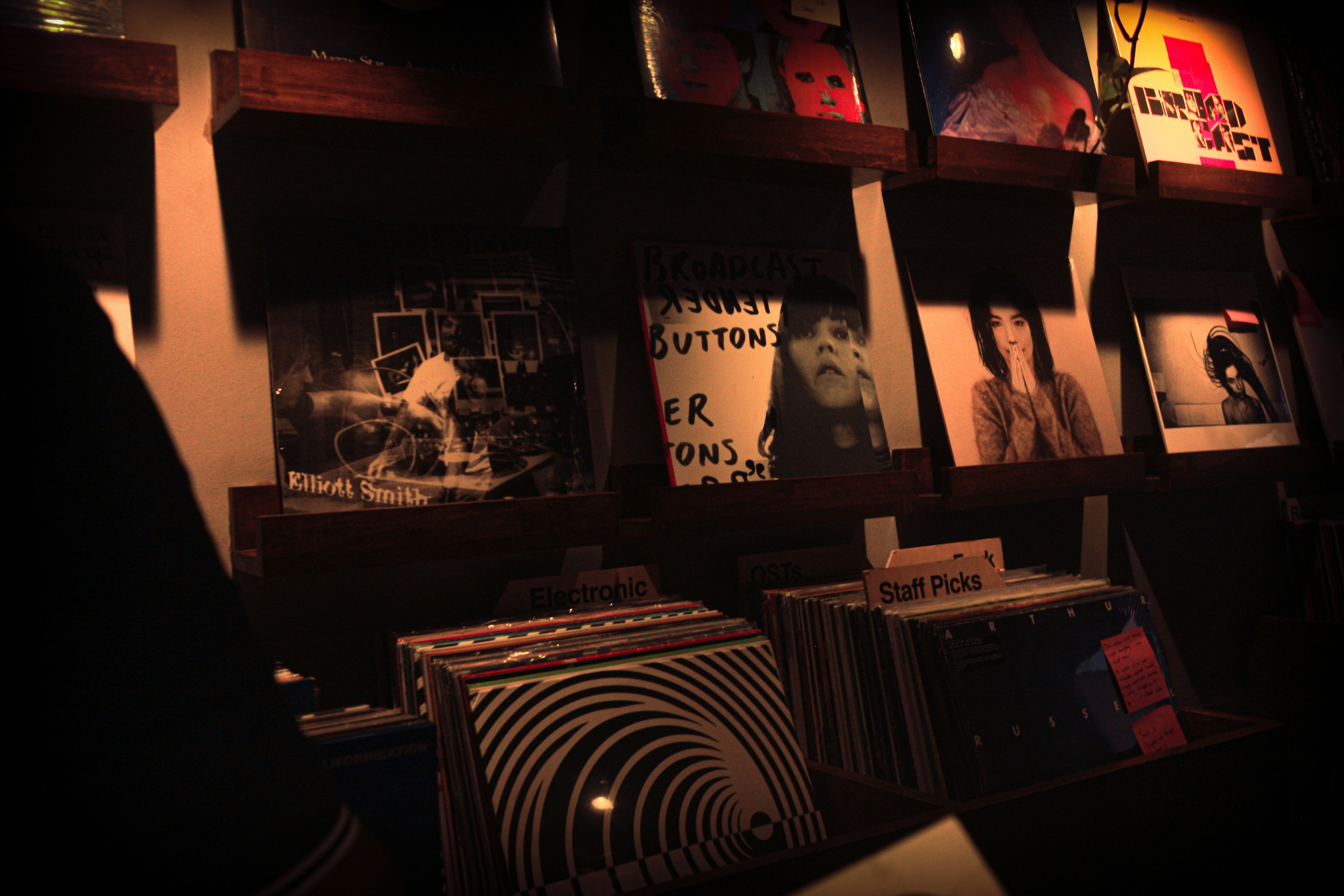 Vinyl Echoes: A Quiet Record Shop Corner in Warm Light