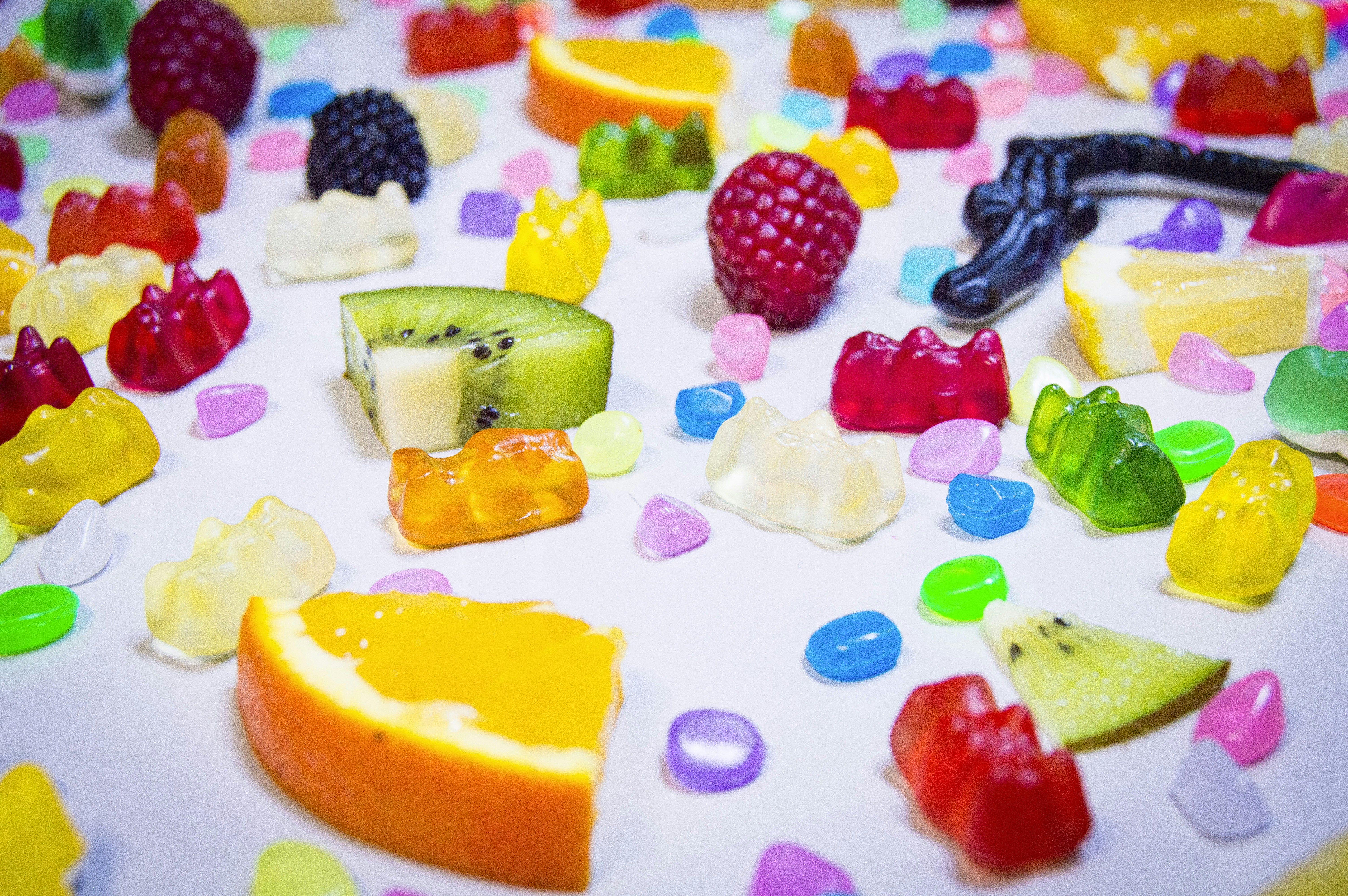 Candy Mosaic: Juicy Fragments on a White Canvas