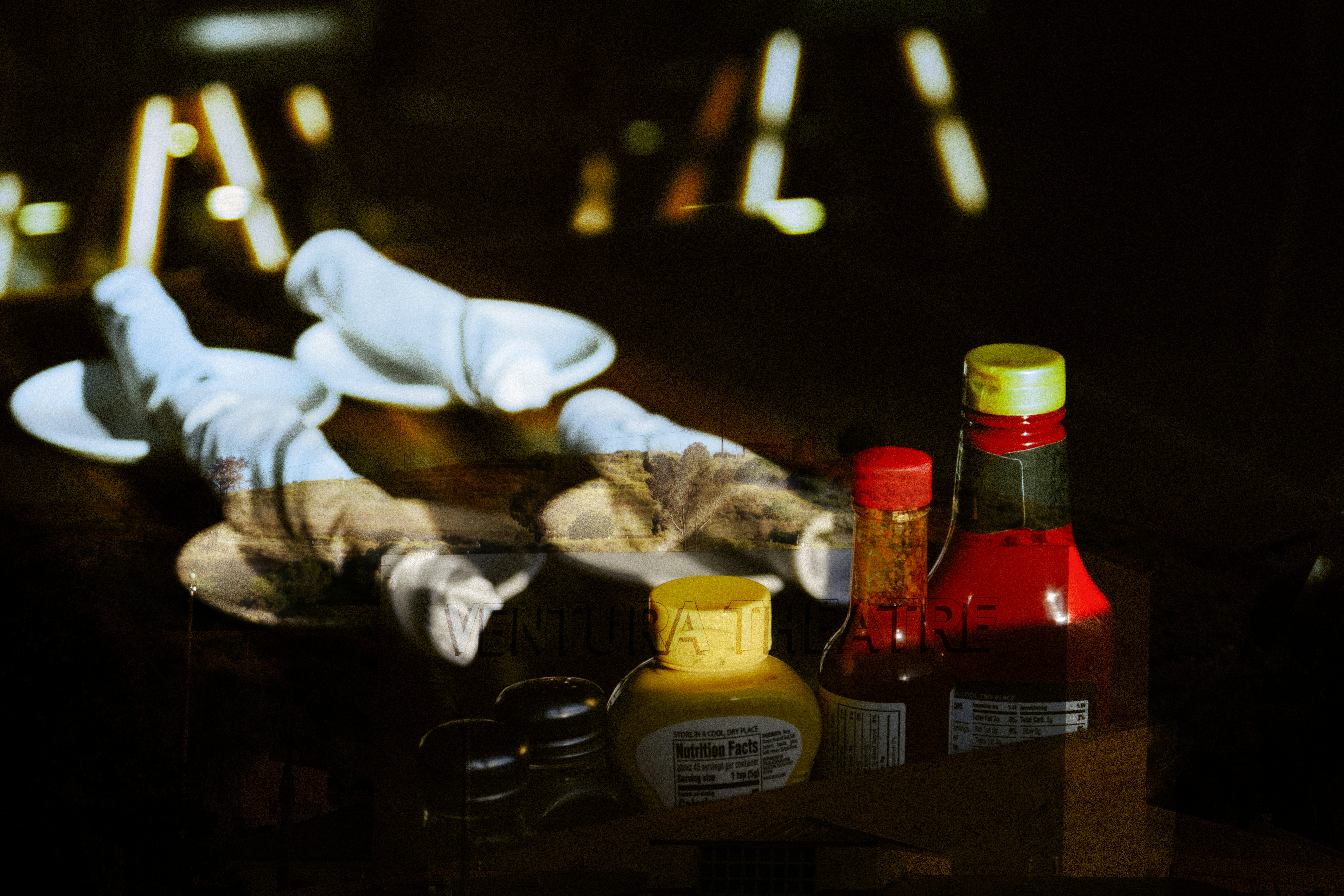 Boots and Condiments in Dim Light: A Stilled Workshop Scene
