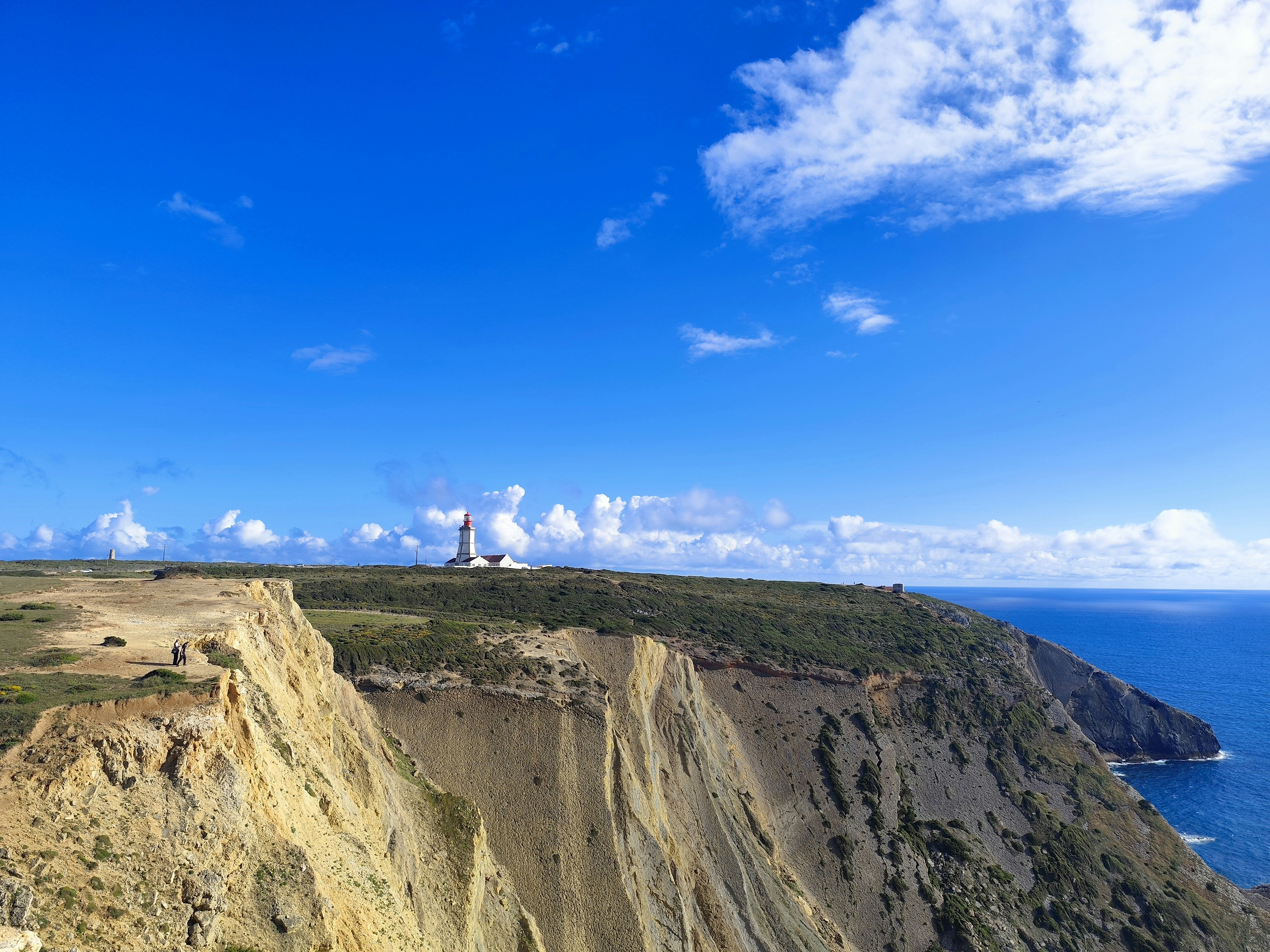 Cliffside Lighthouse Vista at Noon