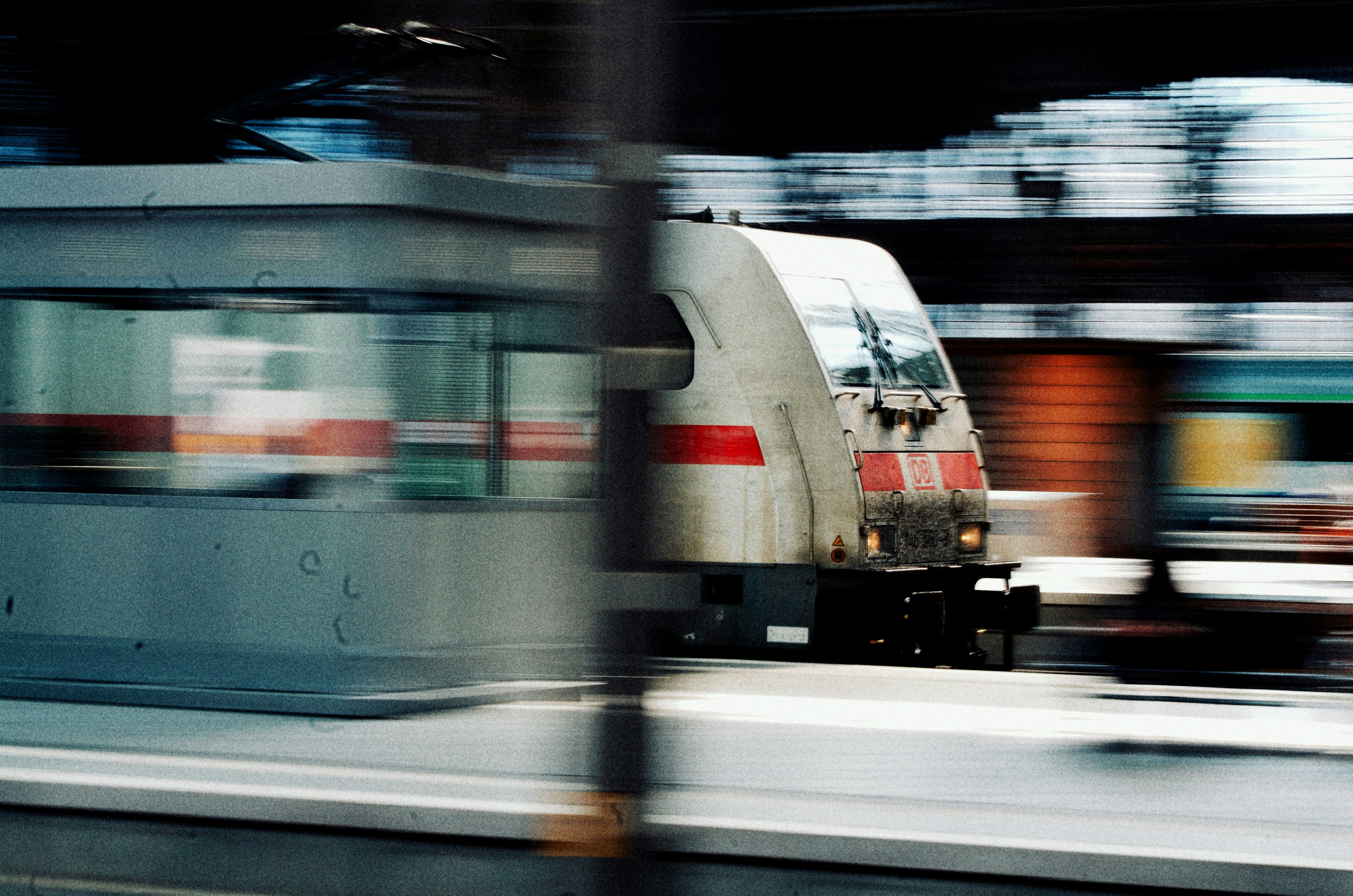 Motion in Glass and Steel: A Train Blurs Through a Station Window