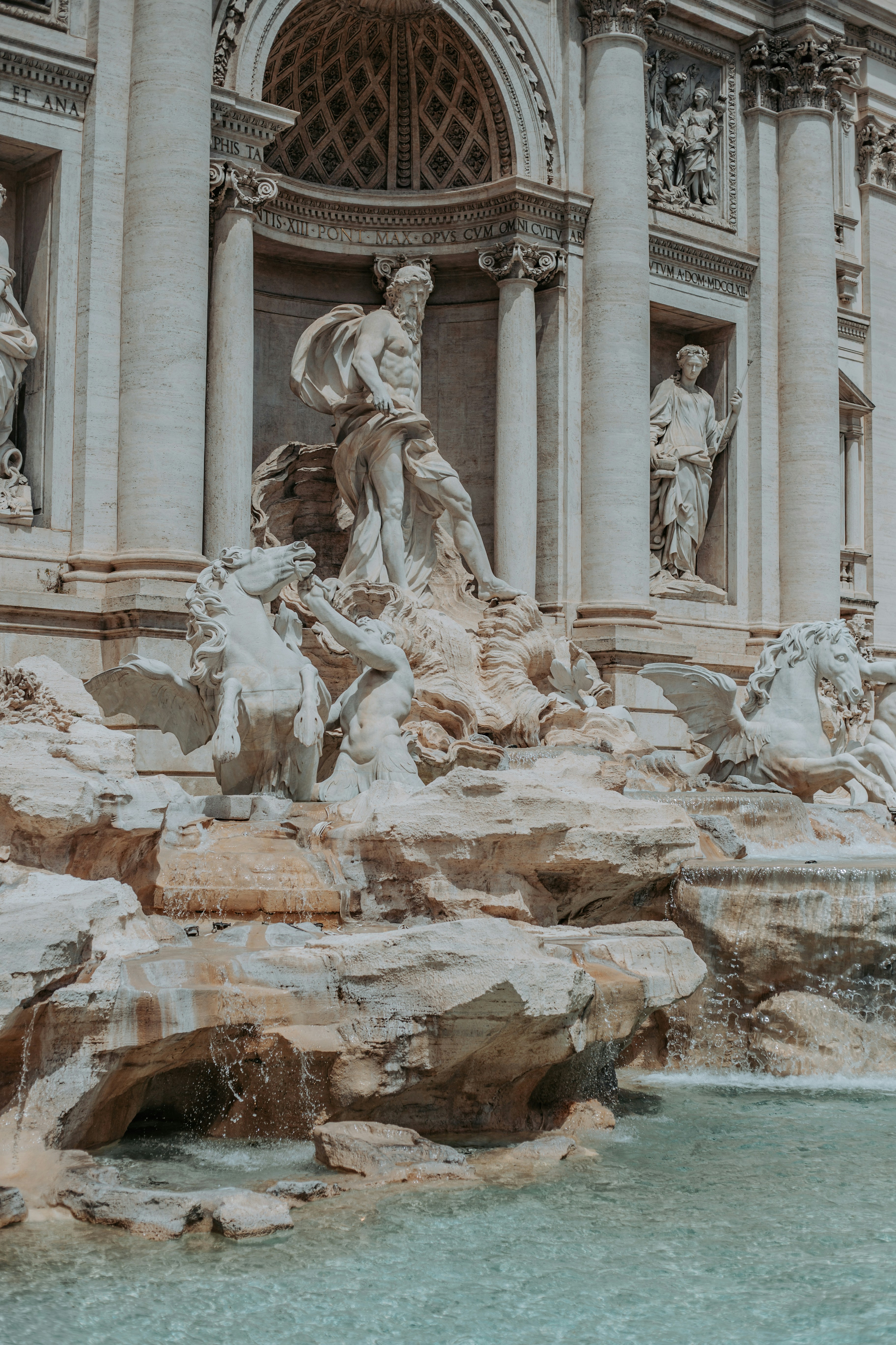 Marble Mastery: Fountain of Sculptural Drama at the Grand Facade