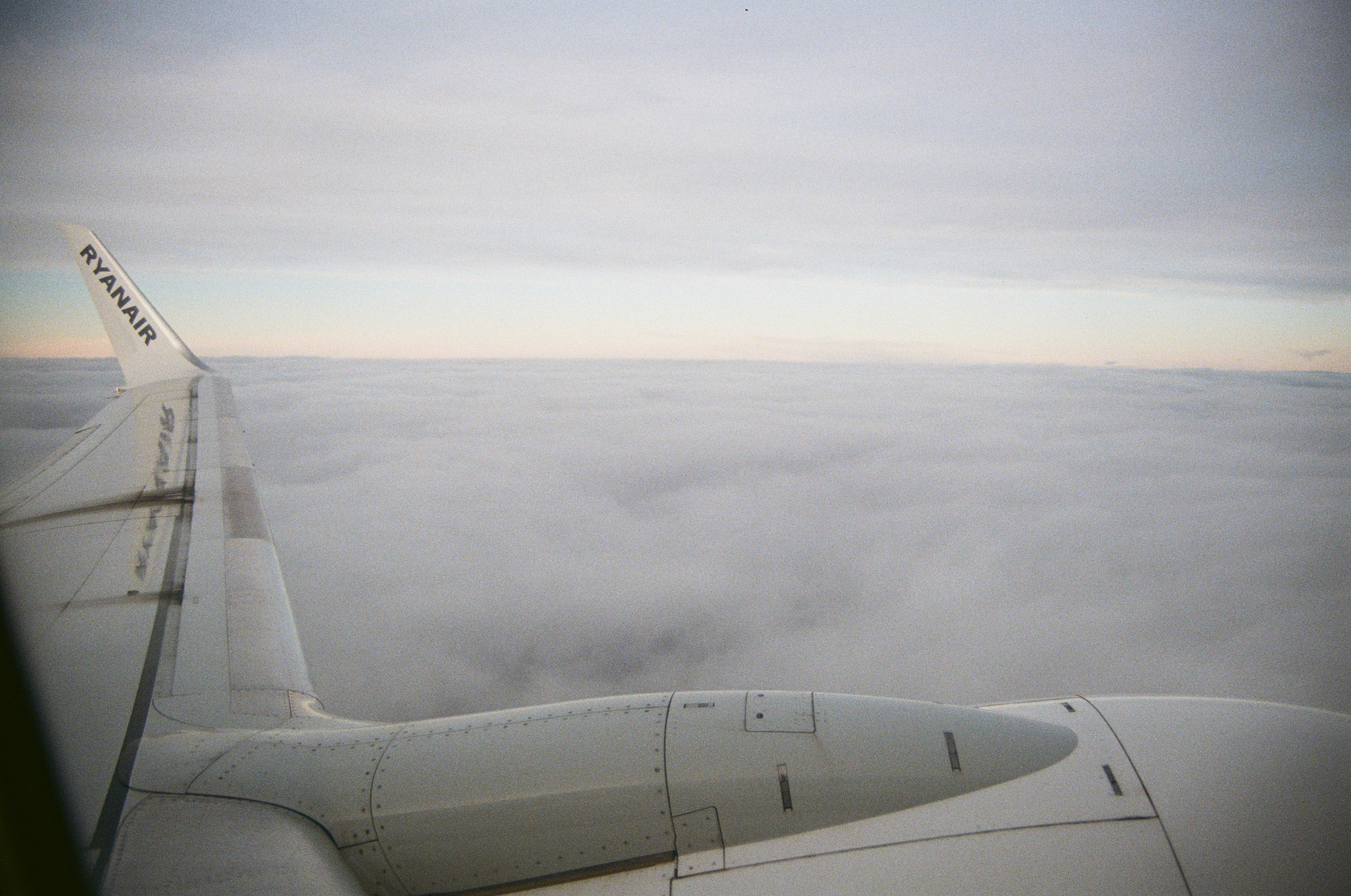 Wing Veil Above the Clouds: A Quiet Transatlantic View