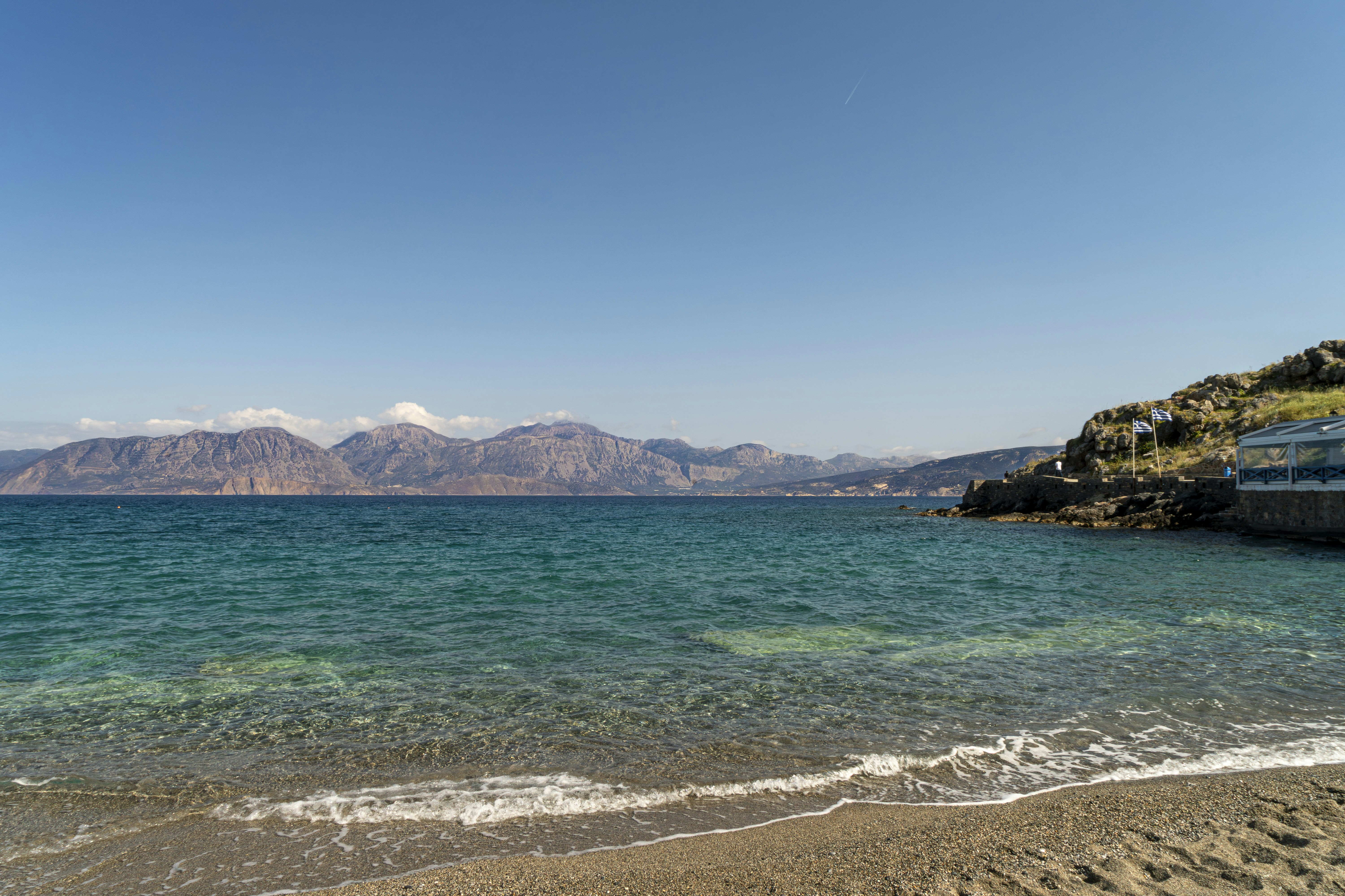 Azure Shoreline Under a Clear Mediterranean Sky