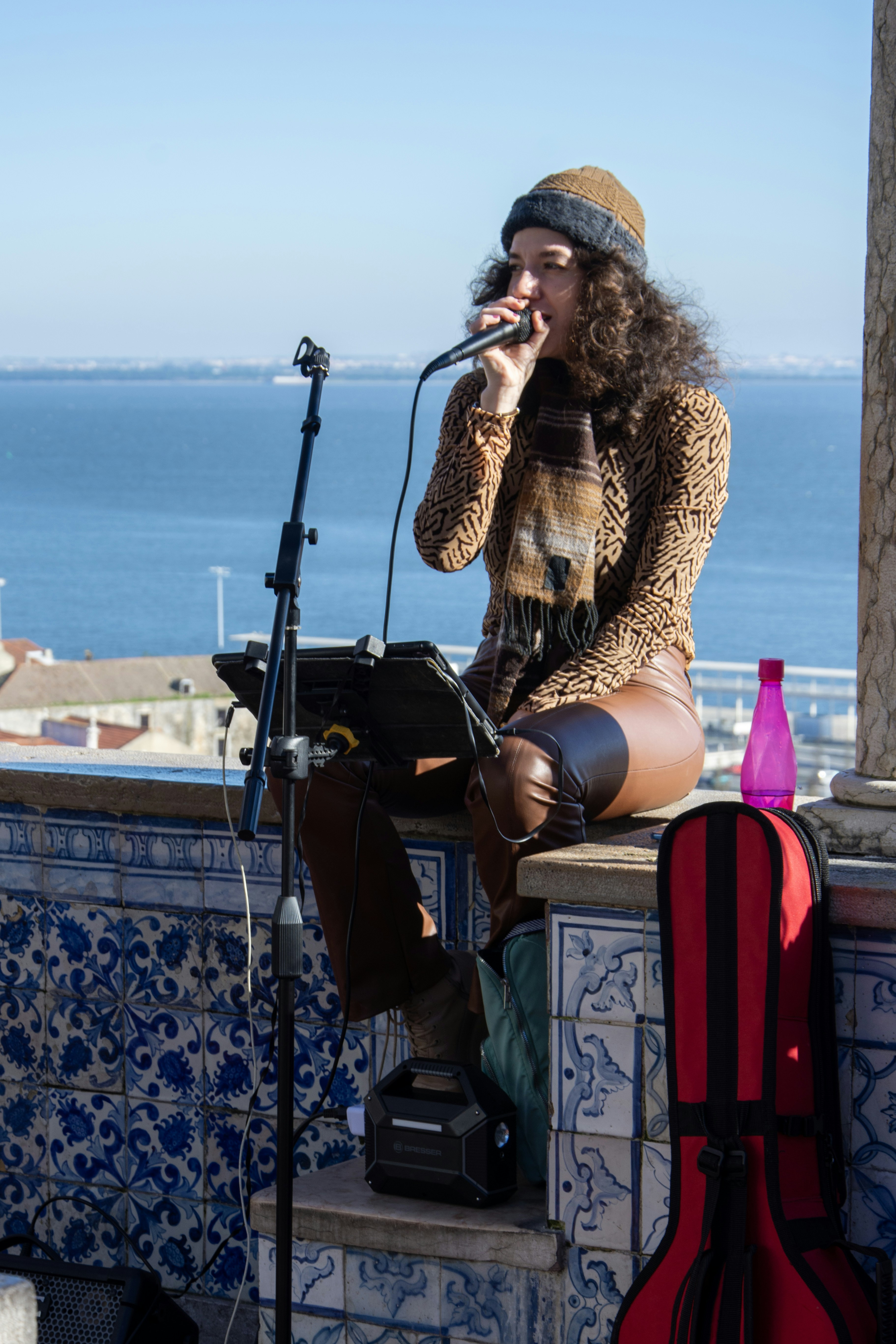Seaside Serenade: A Vocalist Under Open Sky
