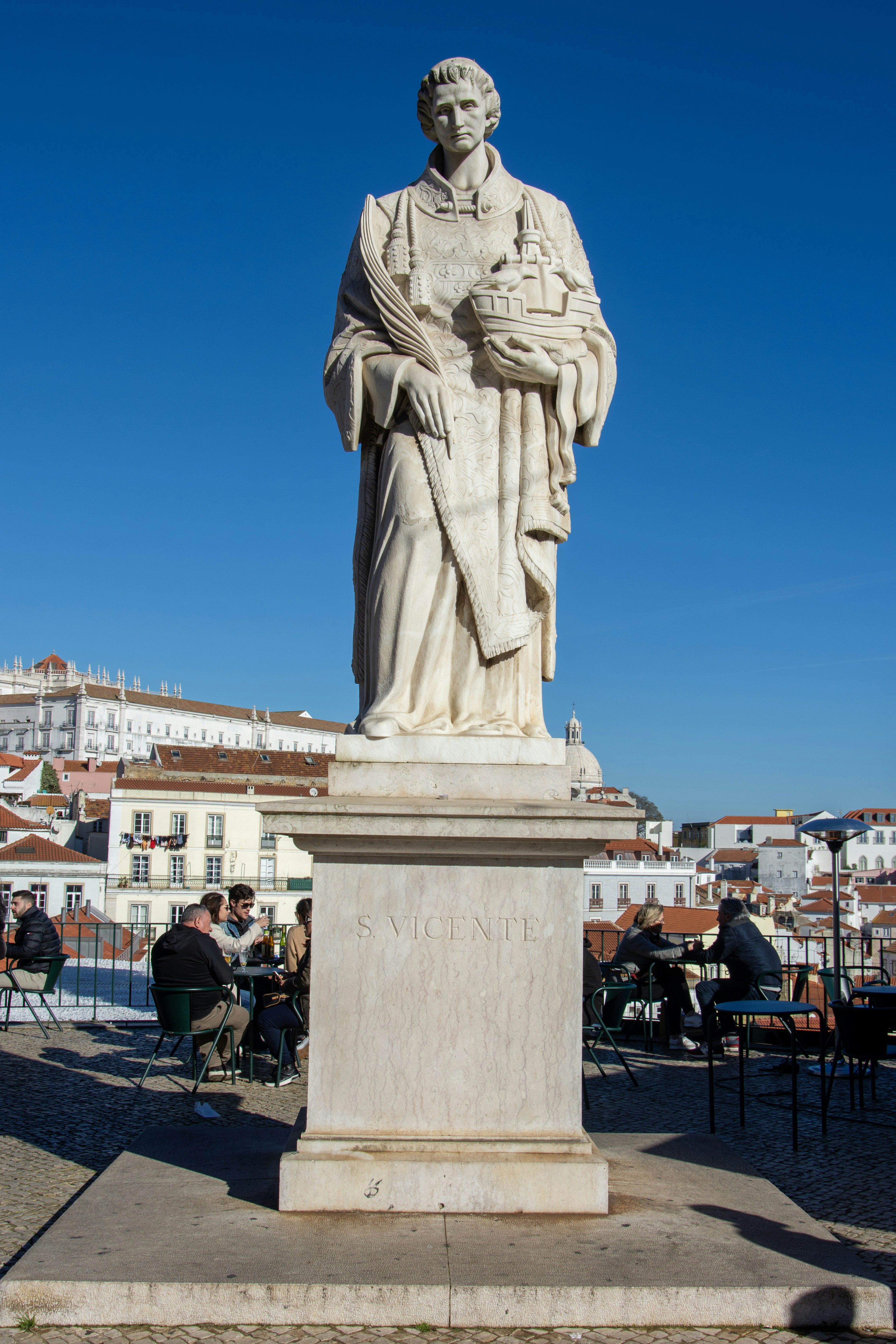 Saintly Presence: A Bust of Saint Vicent at a Lisbon Terrace