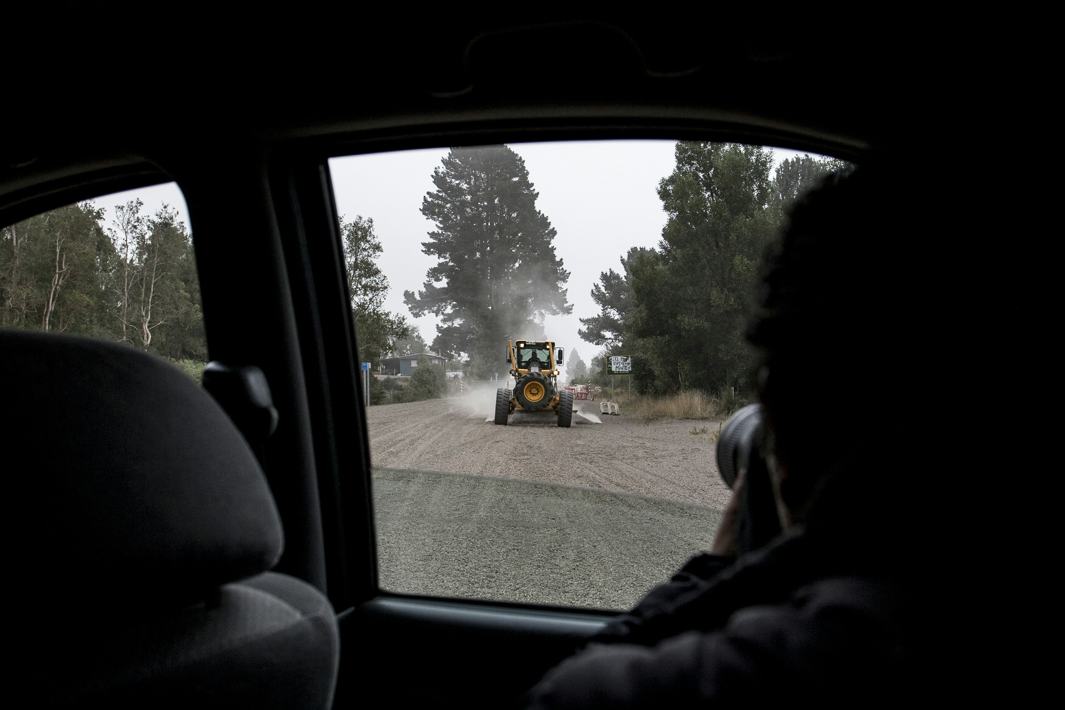 Rear-window Quarry: The Tractor Reclaims the Dirt Road