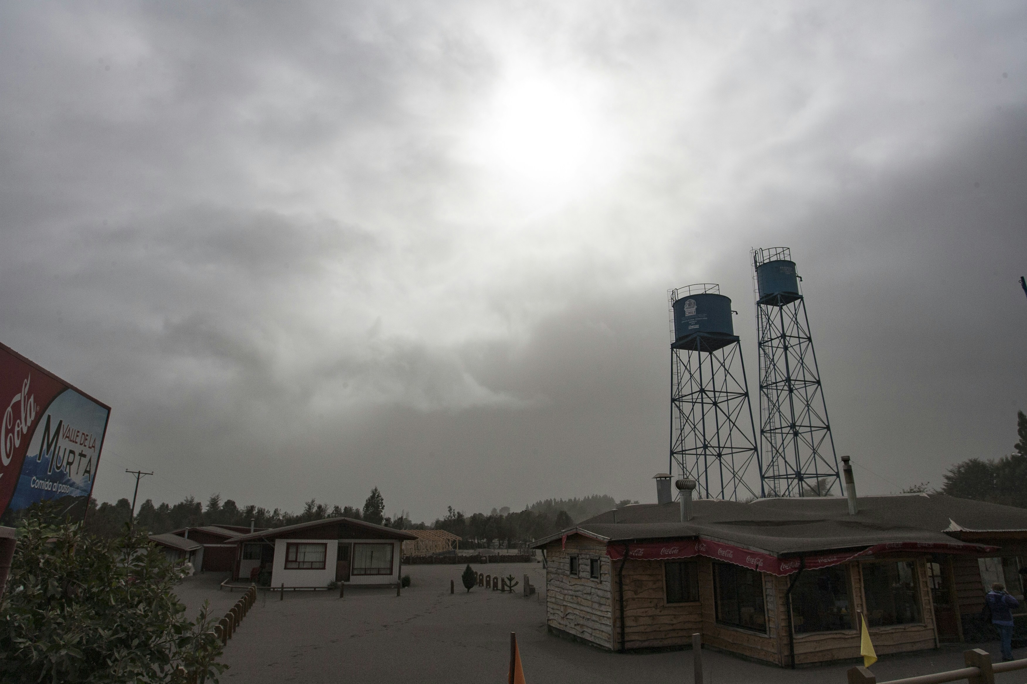 Deserted Feed-and-Greet: Water Towers Over a Quiet Oasis