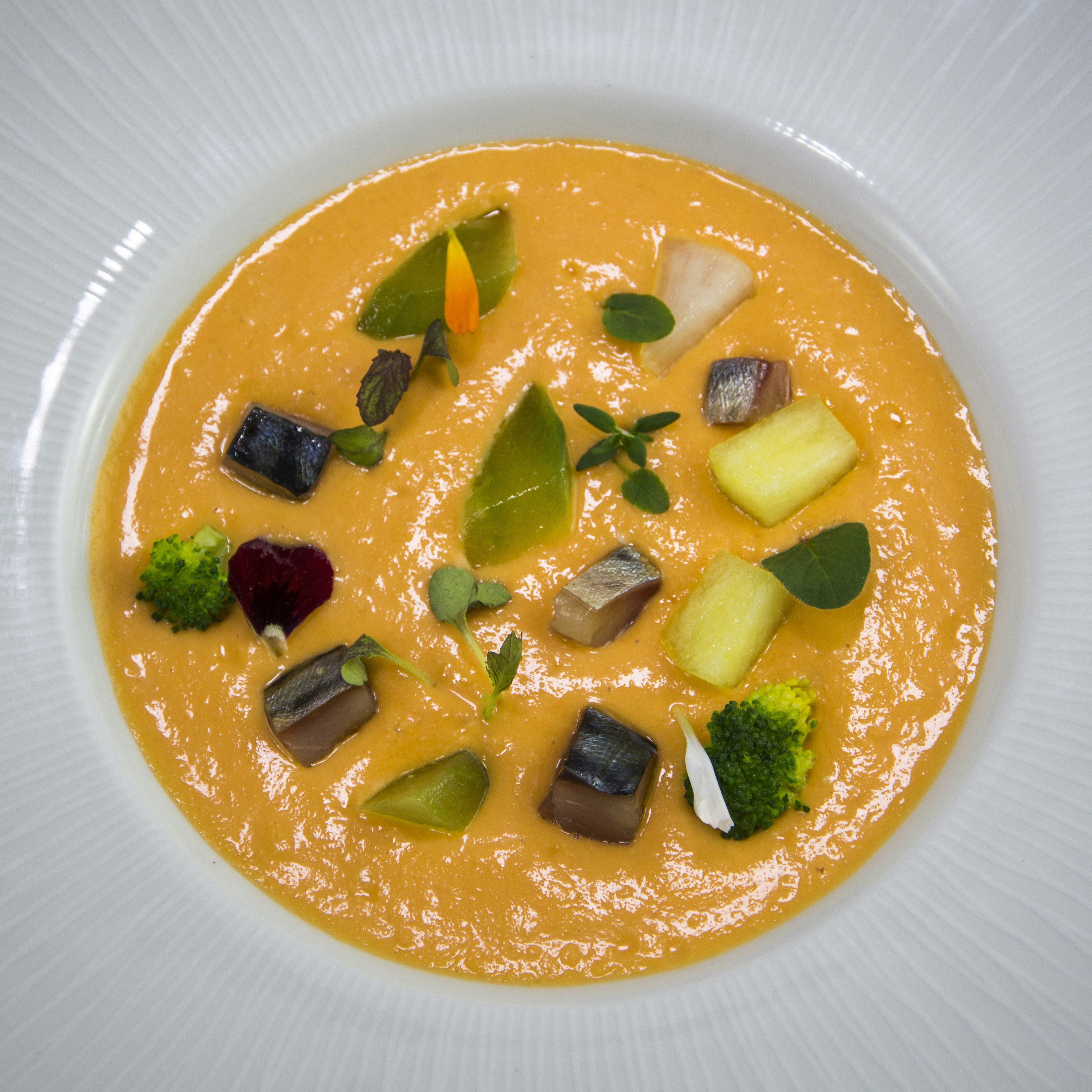 Velvety Carrot-Ginger Soup with Colorful Garnish