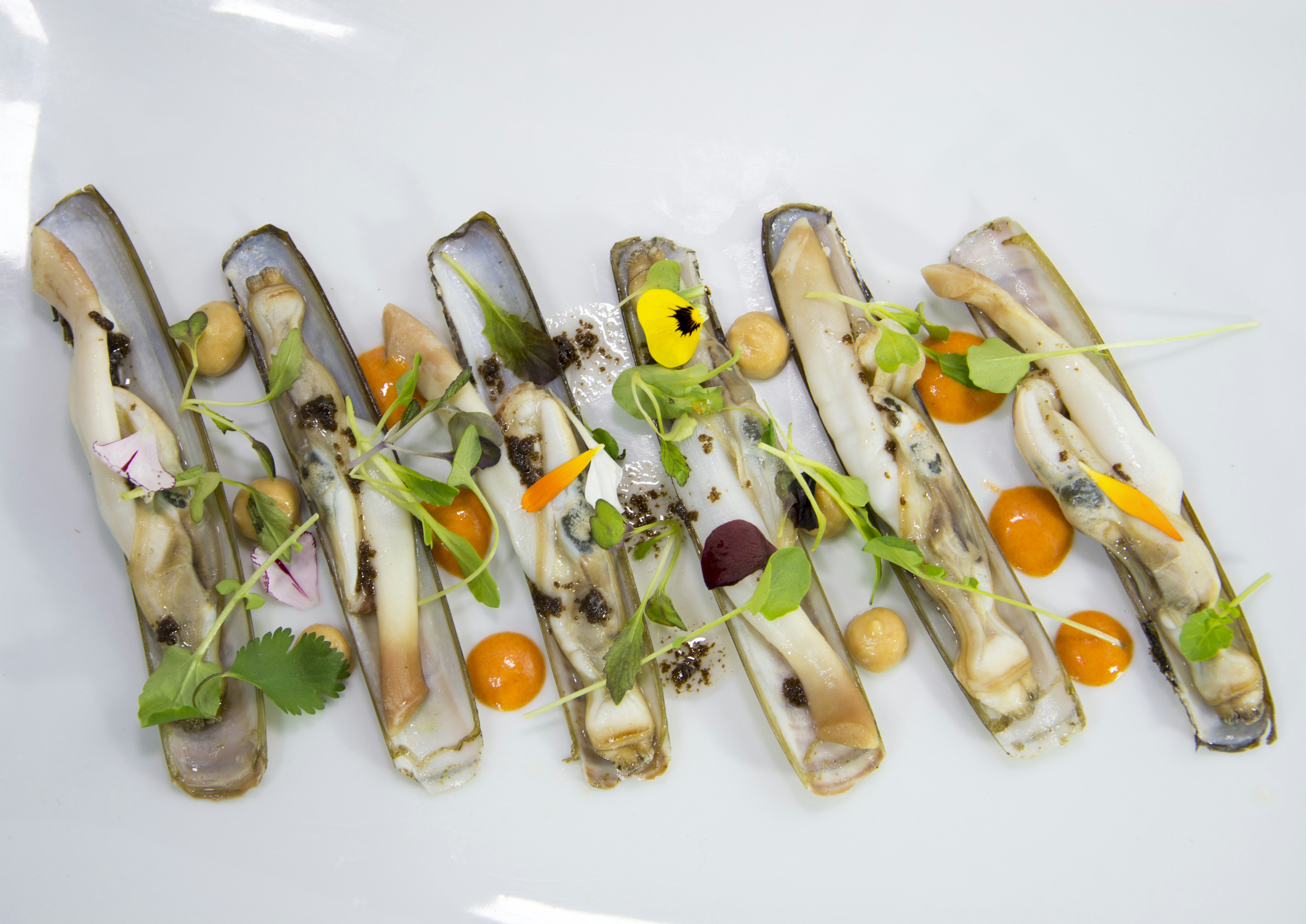 Artful Arrangement: Miniature Lamb Racks as Edible Petals