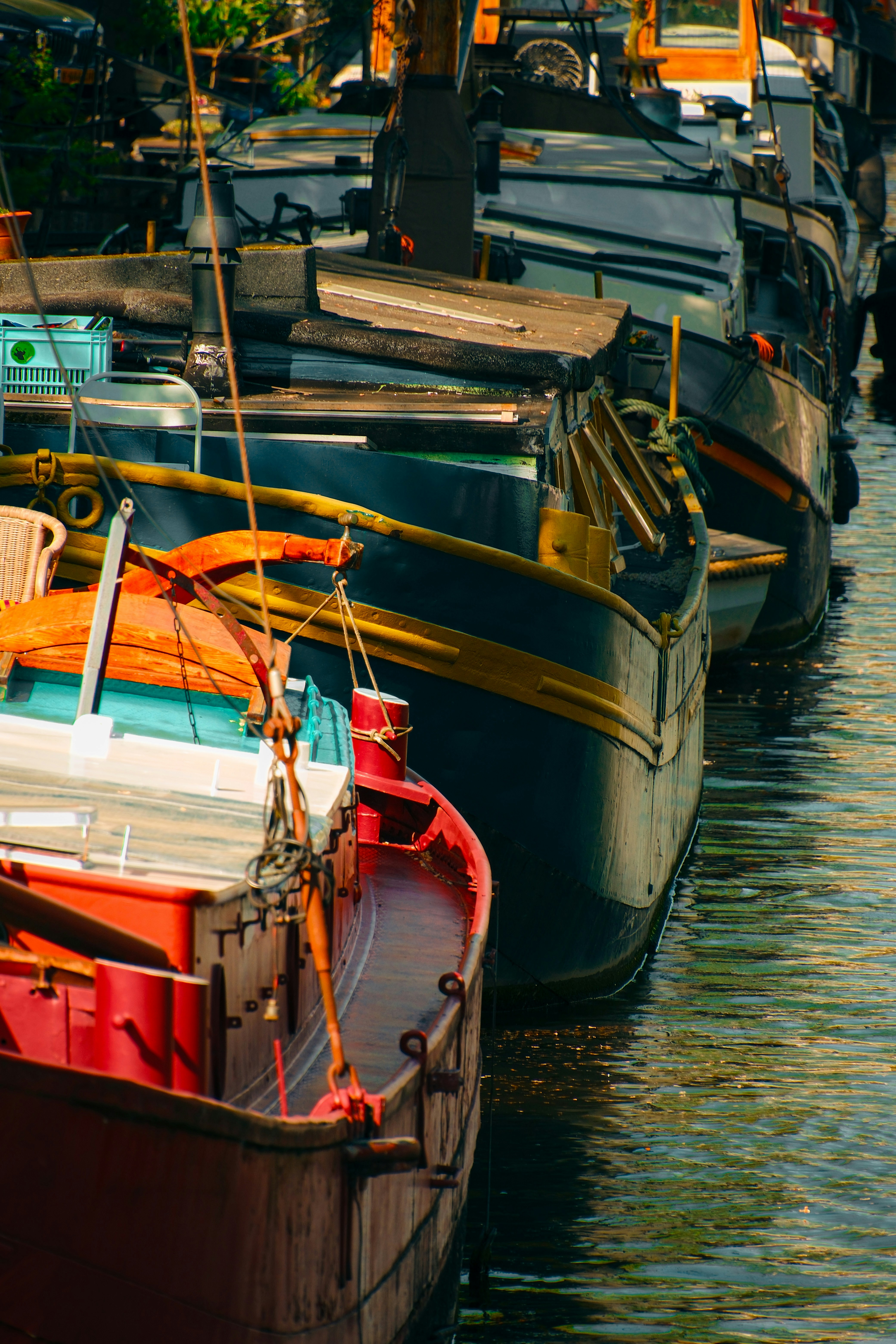 Hull and Harbor: A Tangle of Colorful Boats in Quiet Waterway