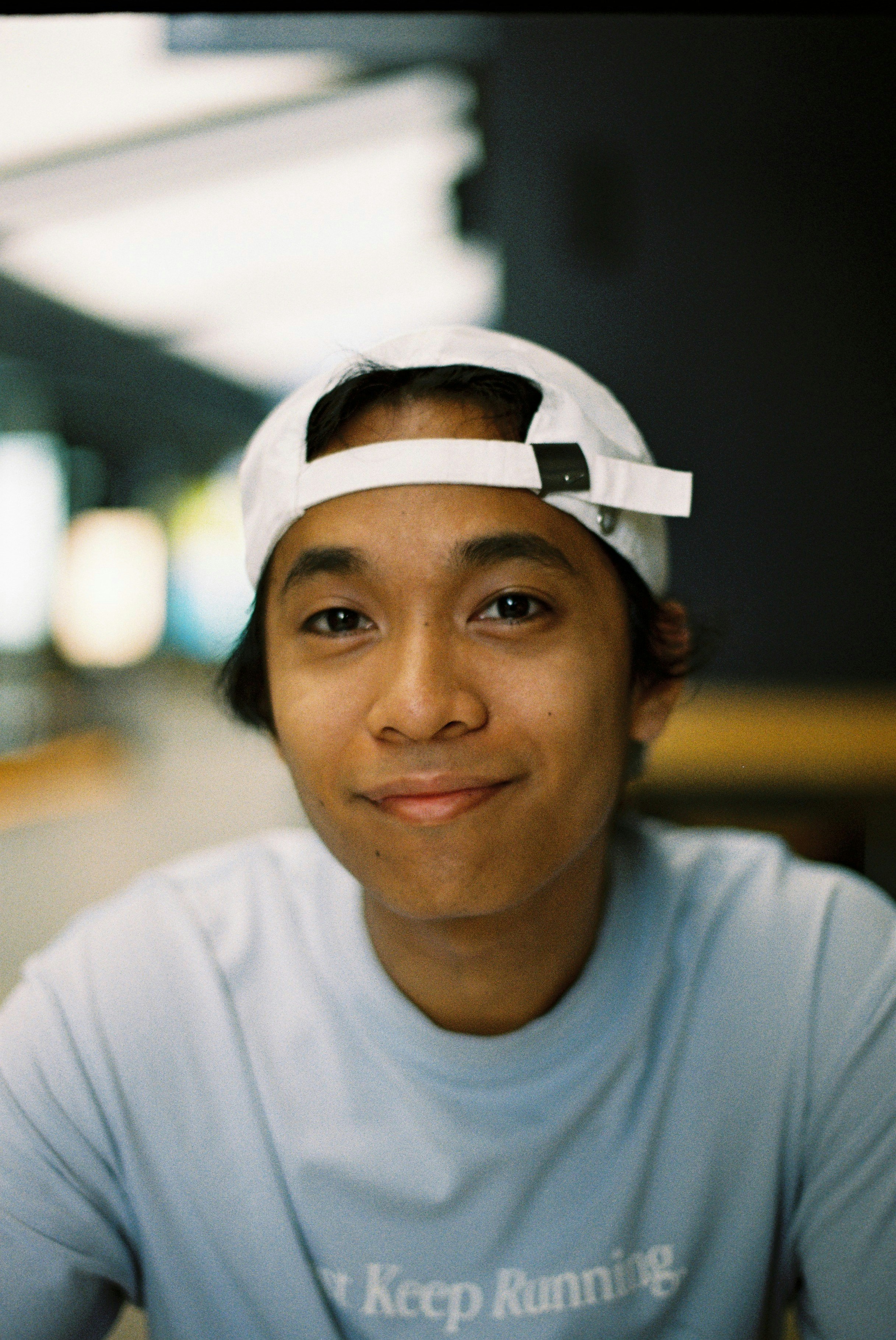 Youthful Portrait in Soft Focus with Baseball Cap