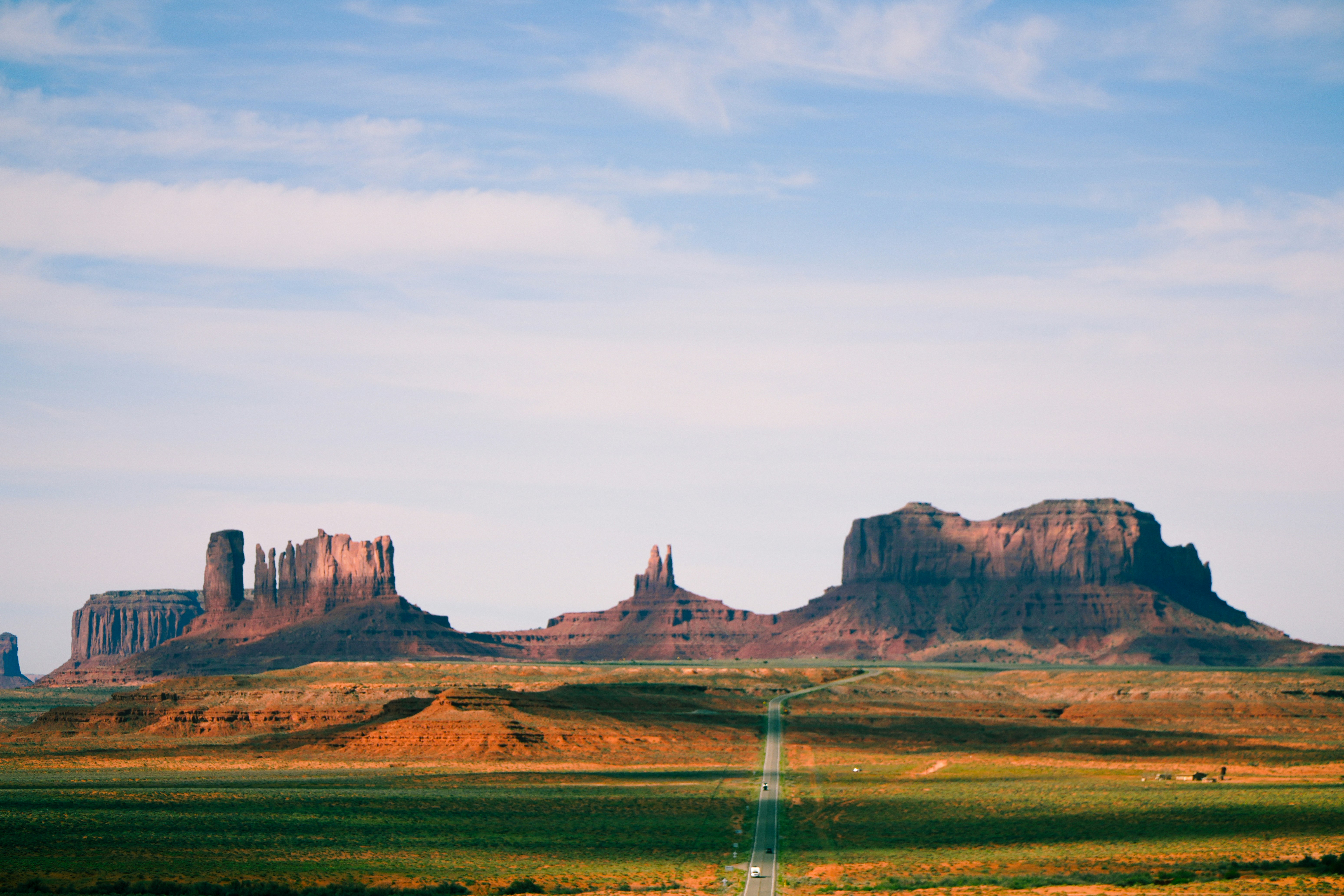 Monumental Mesas Along a Painted Plains Road