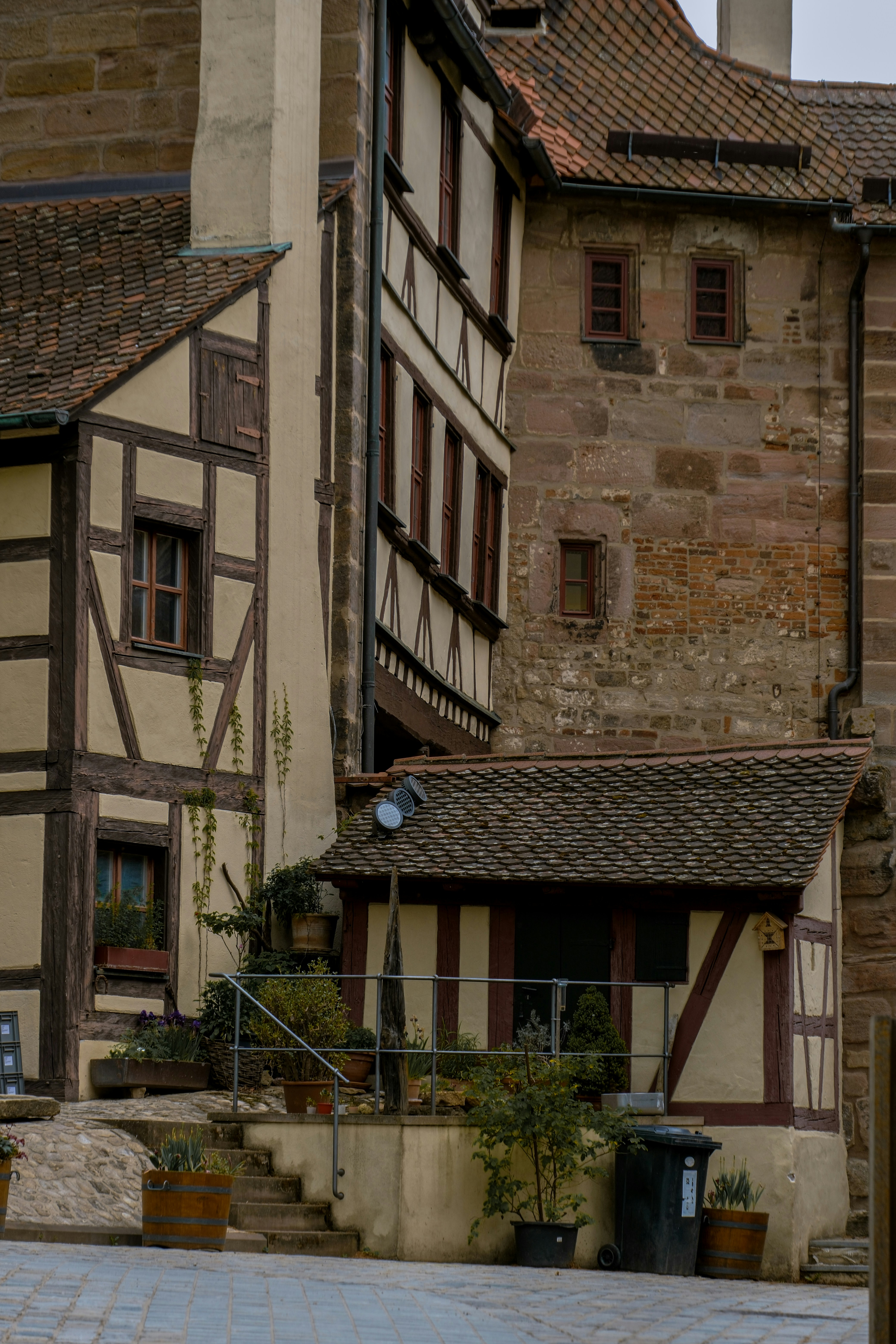 Timbered Facades and Quiet Courtyard of a Medieval Village