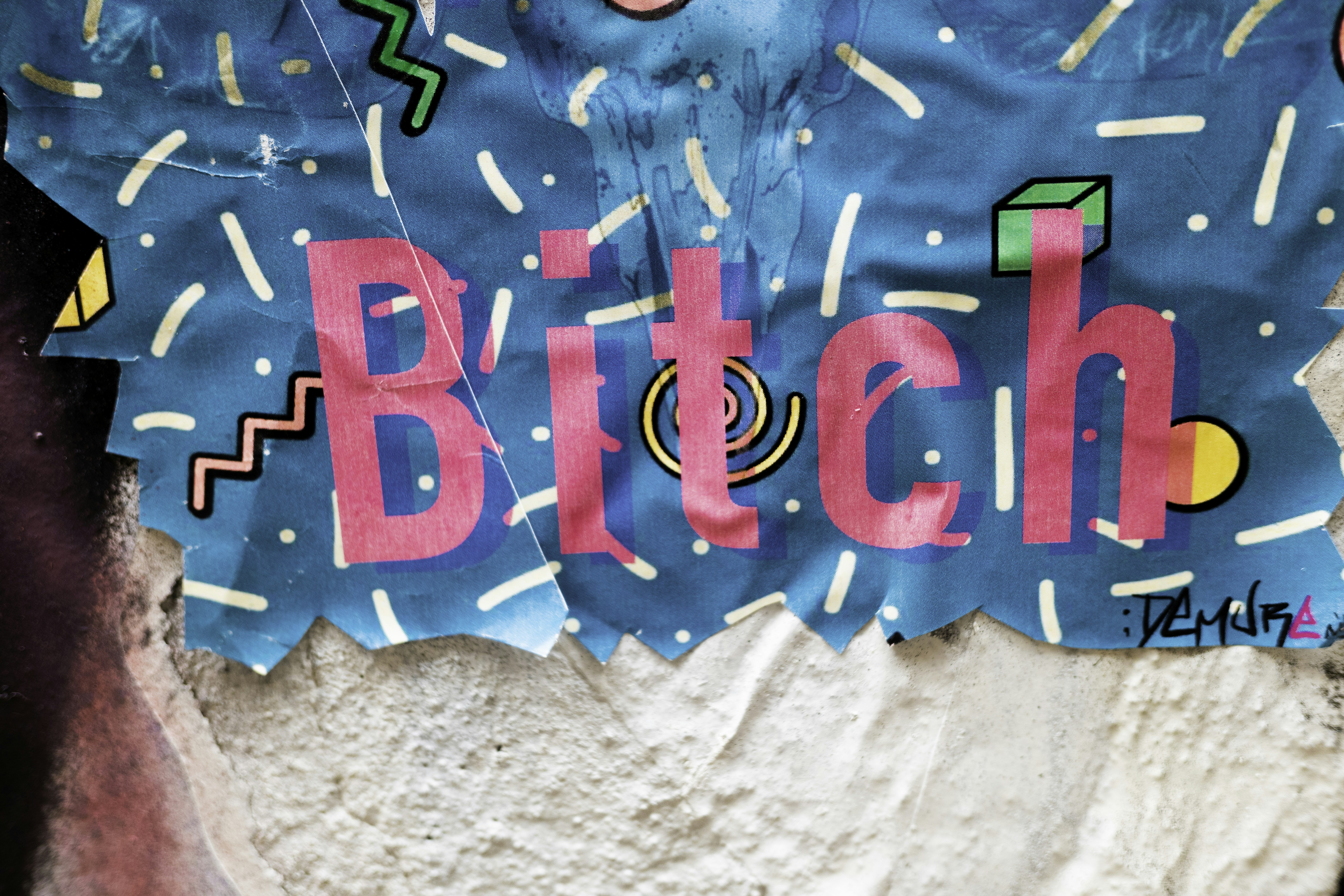 Neon Graffiti Teasing the Edge of Wall