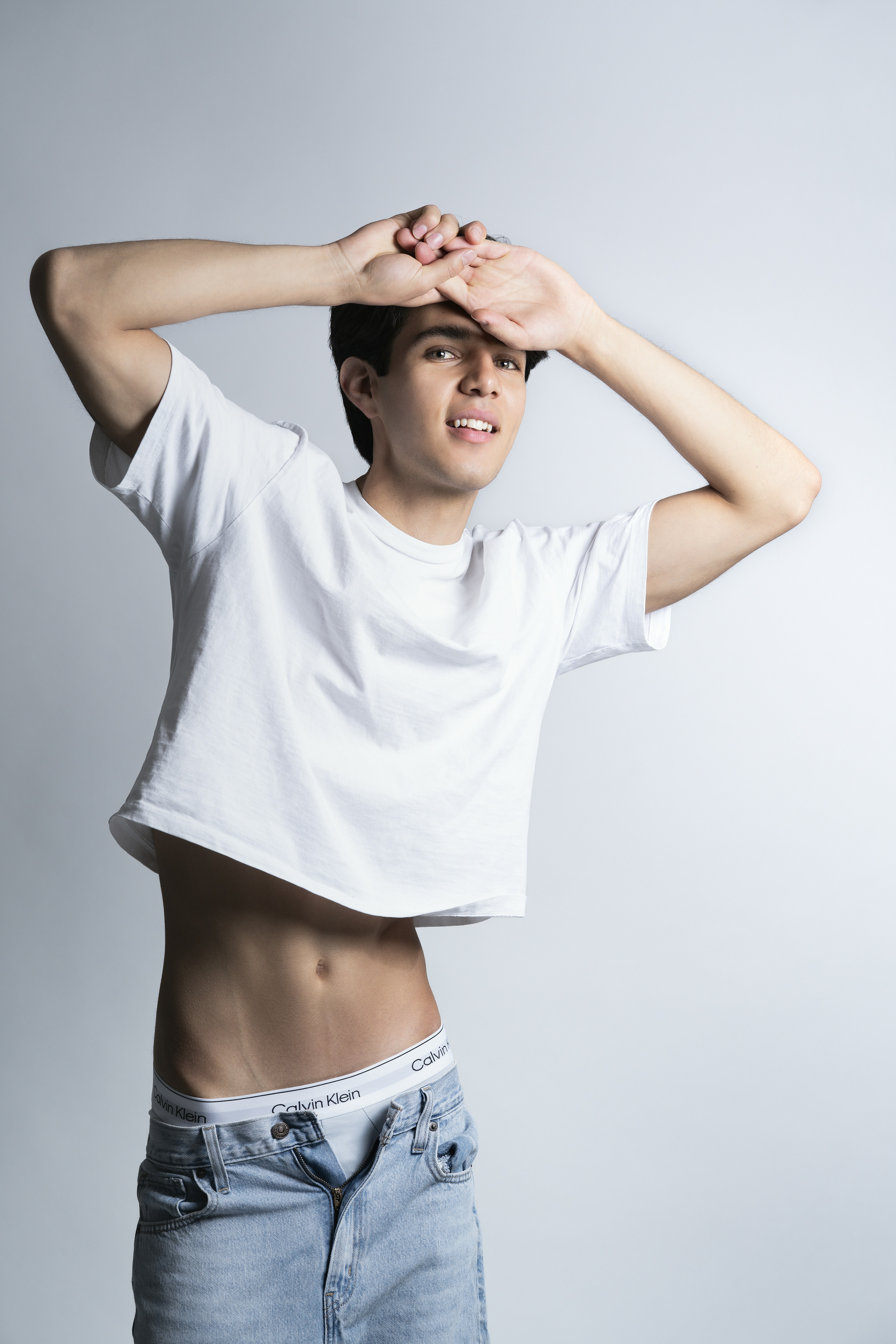 Pause and Play: A Youthful Pose in White