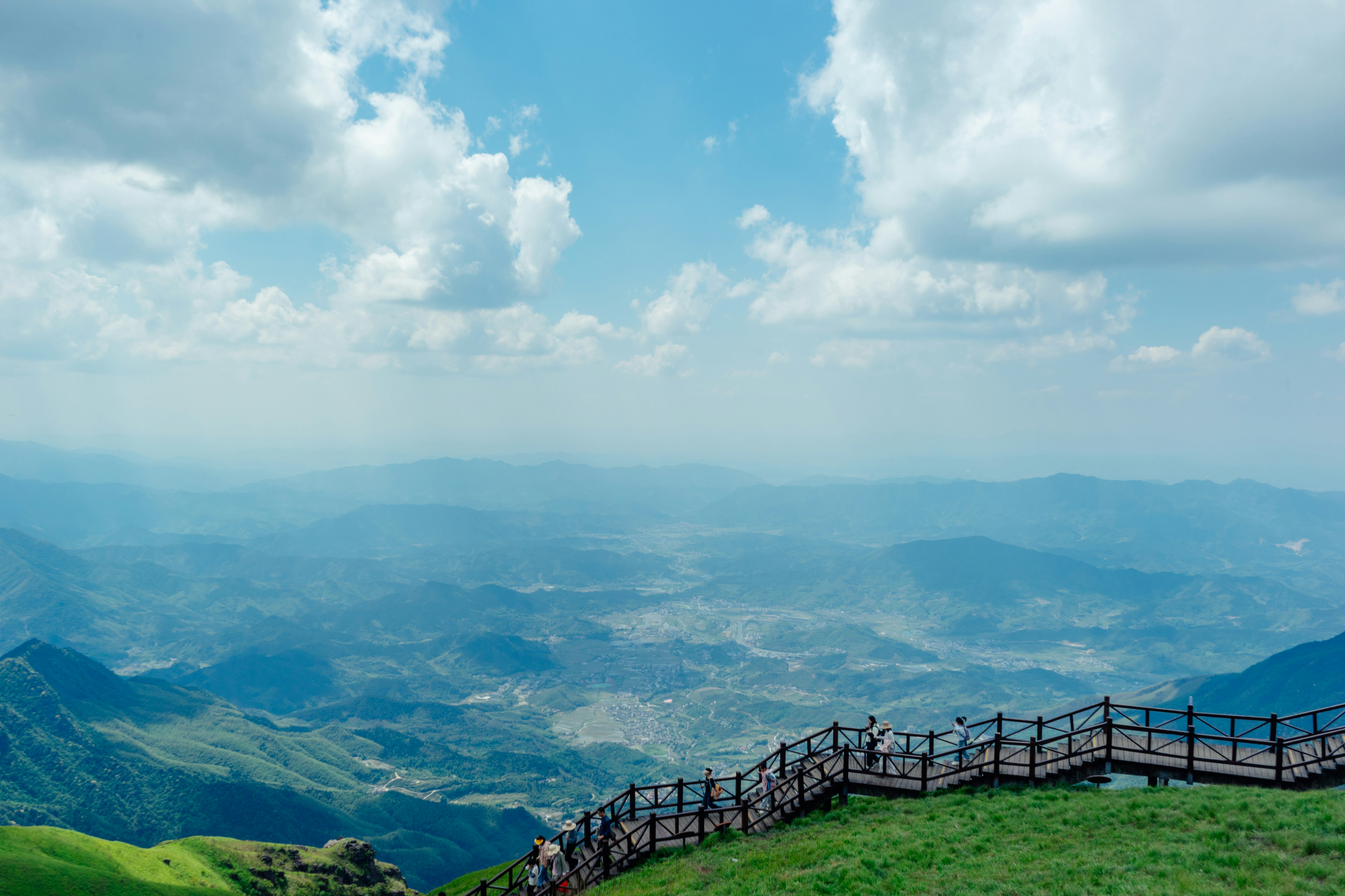 Vista from the Ridge: A Path with Panoramic Valley Backdrop