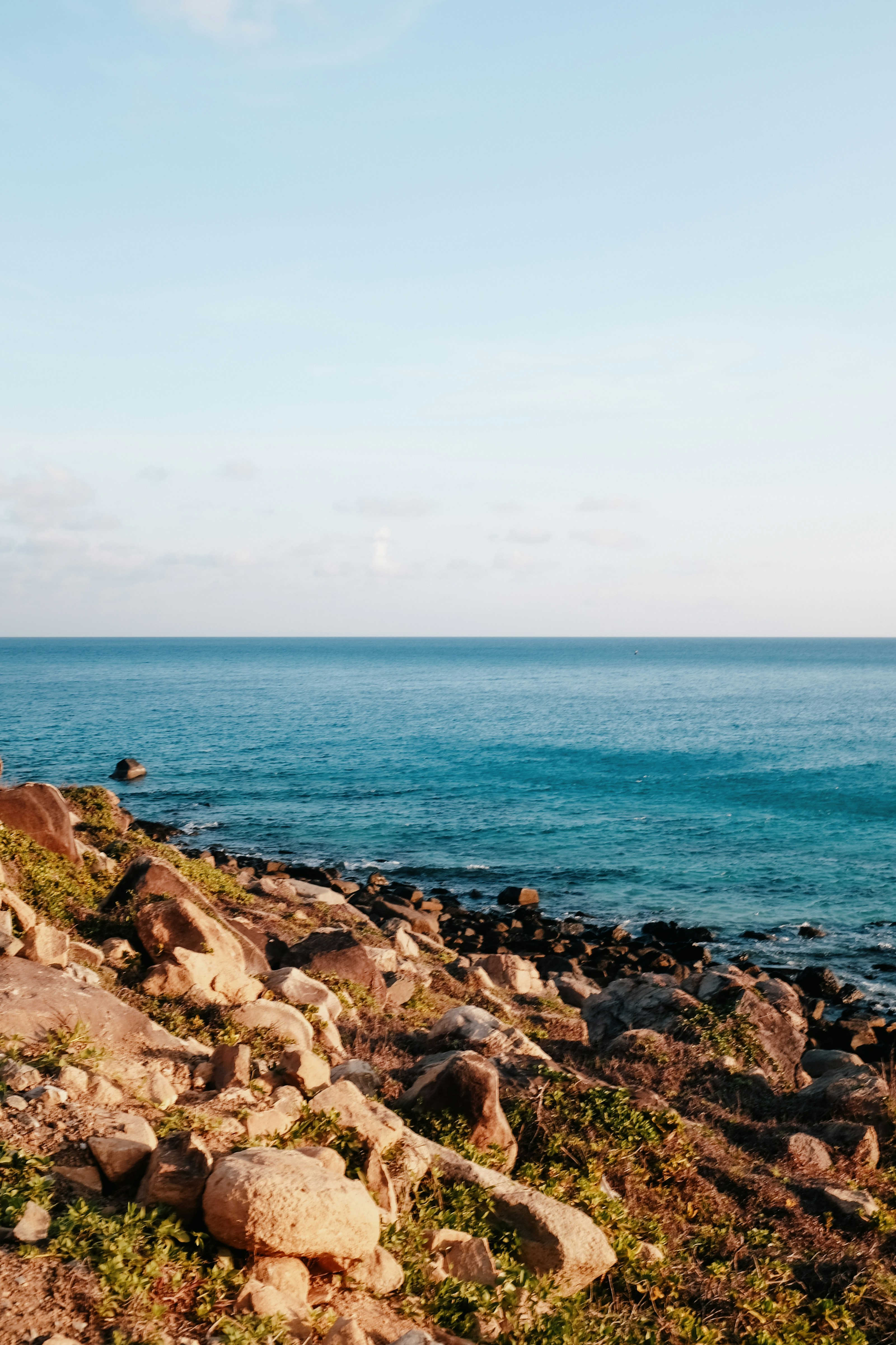 Coastal Tor on a Clear Day: Rocks Meet the Open Sea