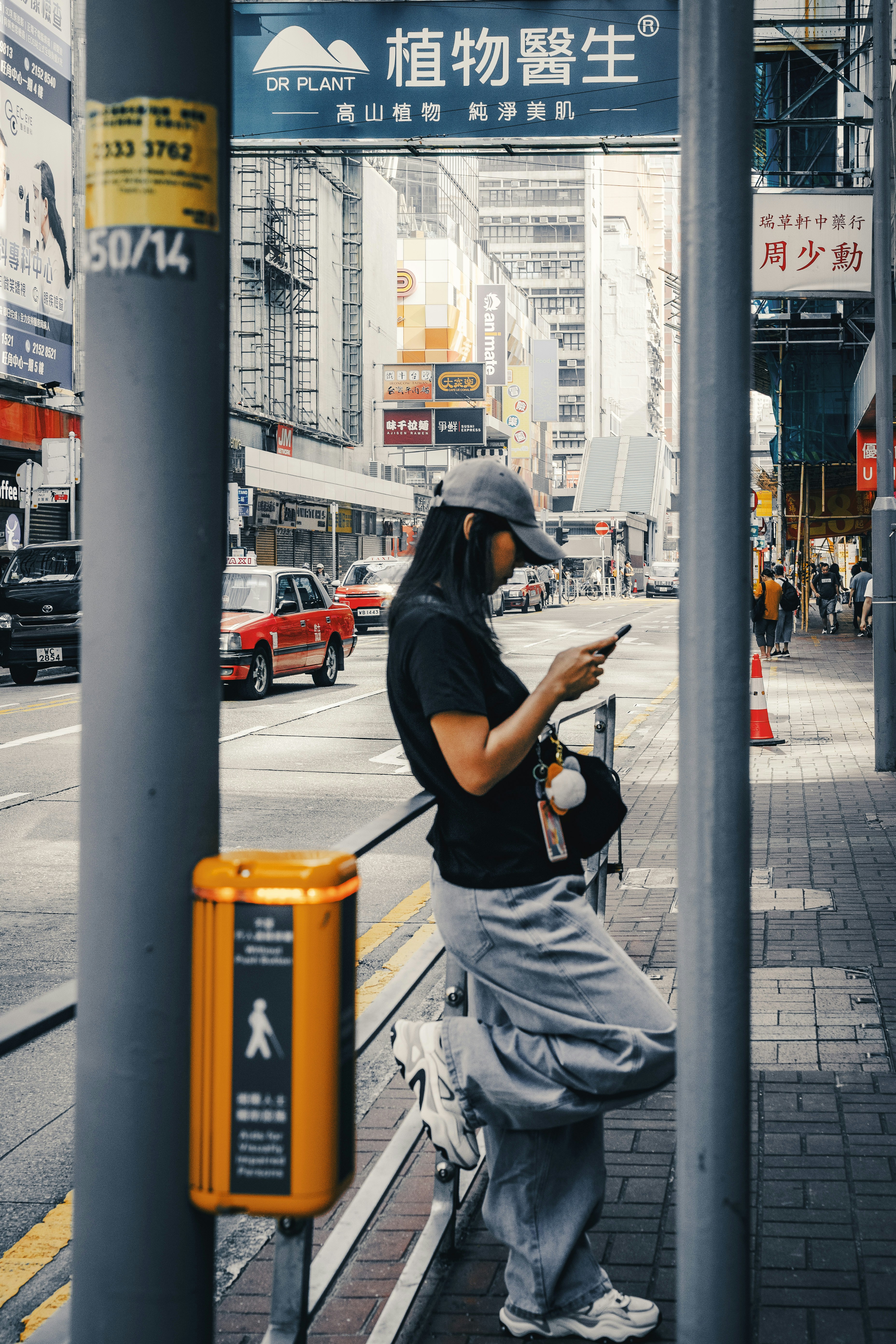 Pedestrian Portrait in a Busy Urban Corridor