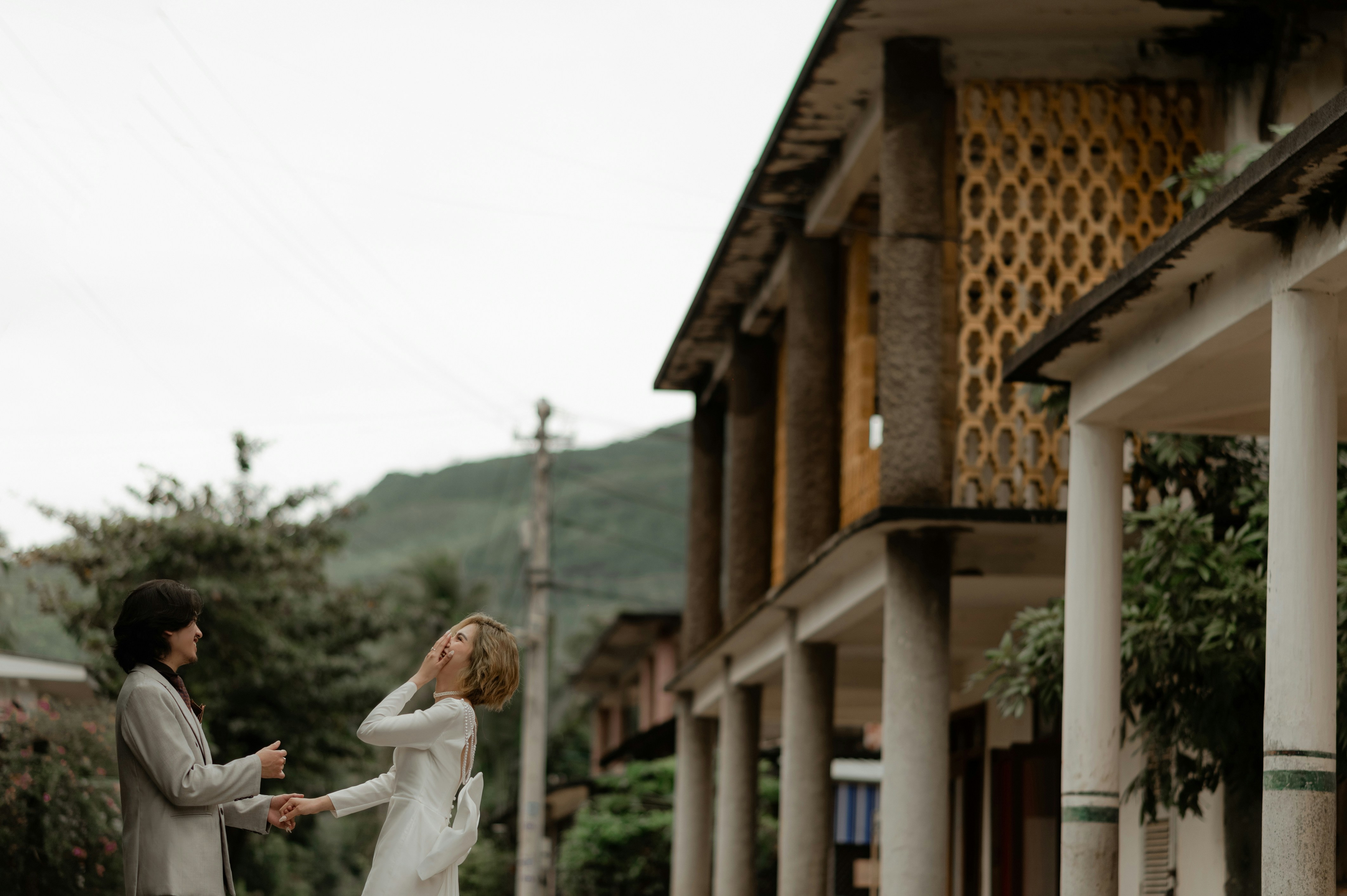 Handshake Under a Quiet Balcony: A Moment Between Strangers