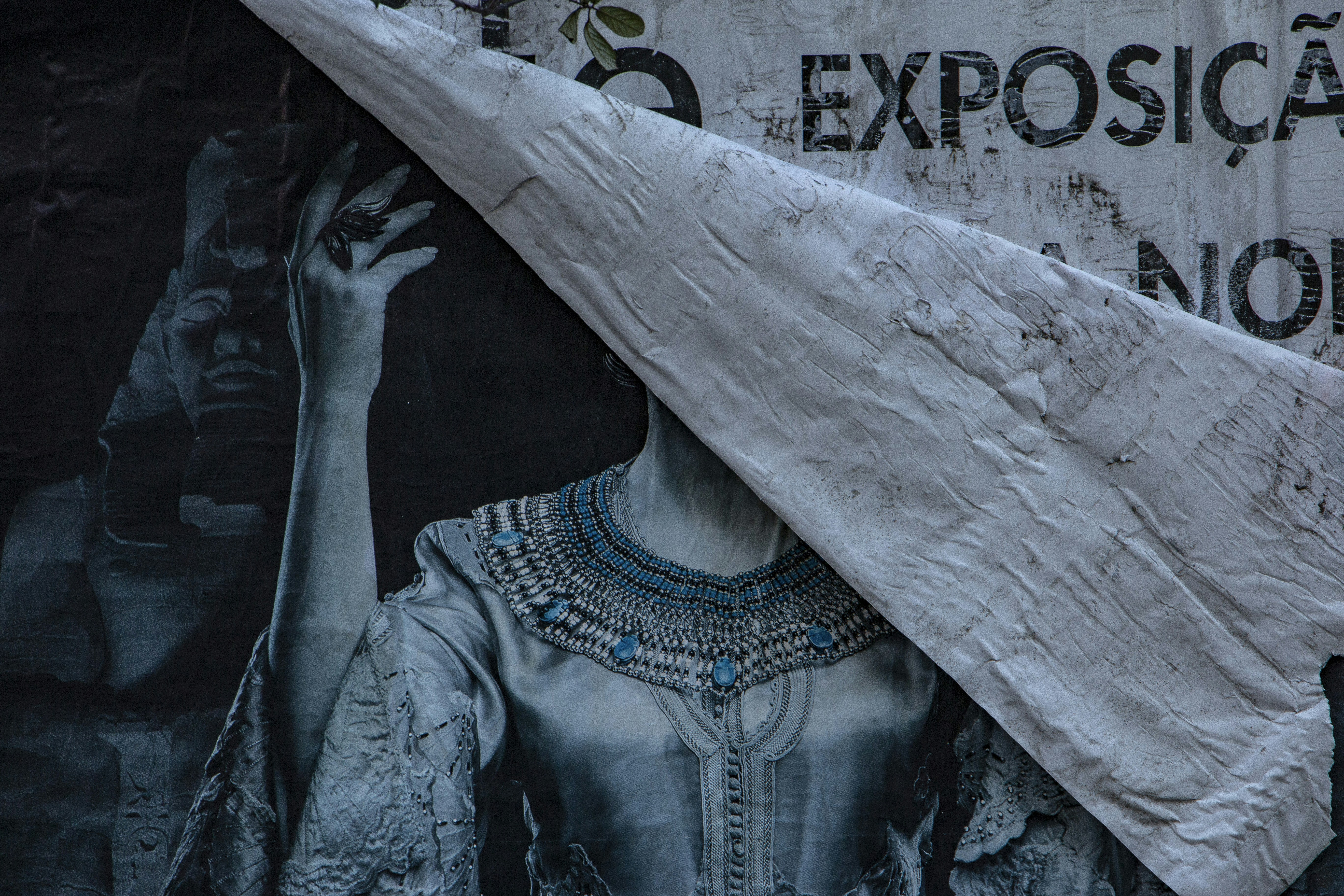 Veiled Portrait: Fragments of a Hidden Face Behind Tattered Fabric
