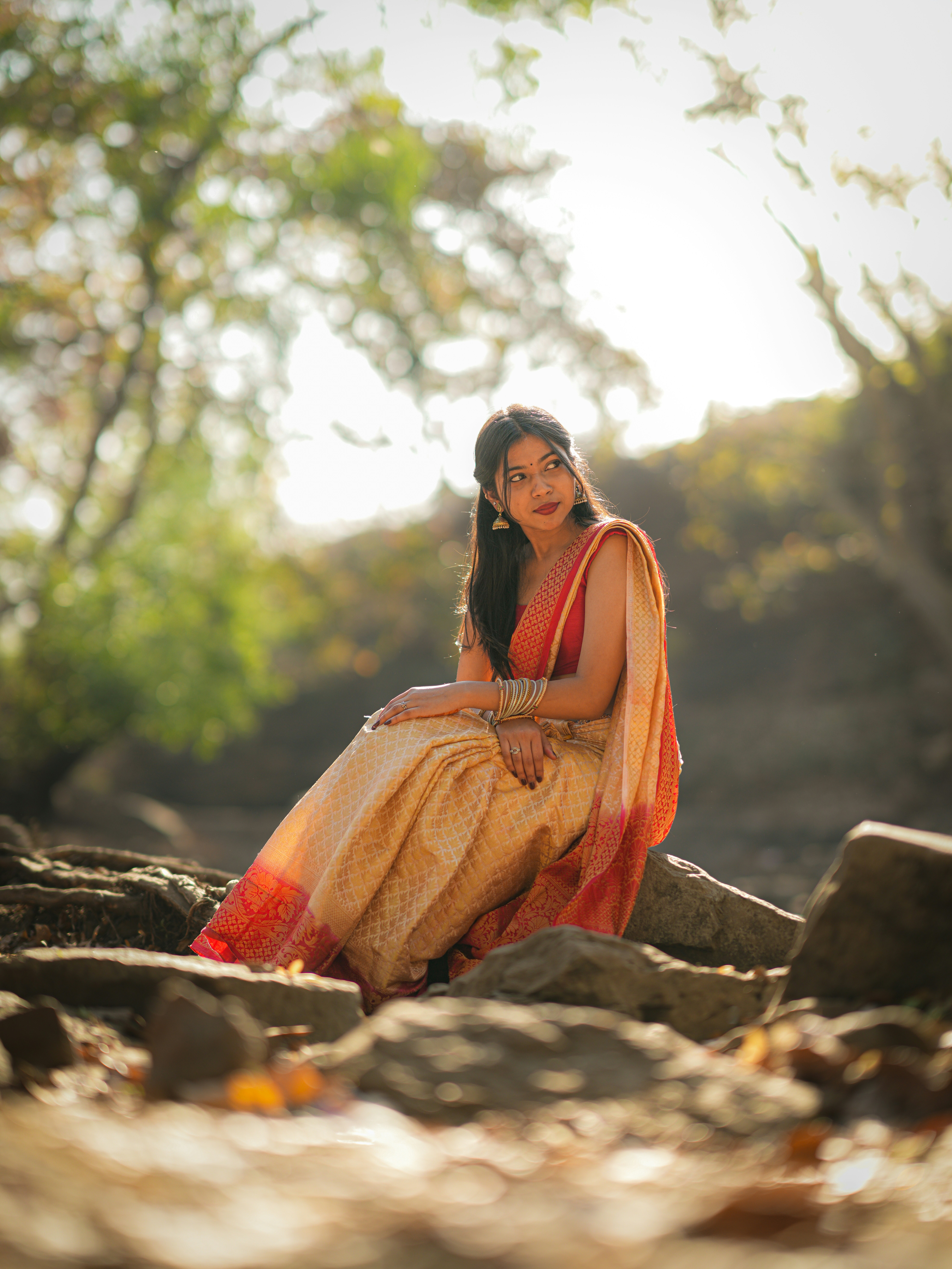Sunlit Grace: A Portrait in Golden Drapery by the Stream