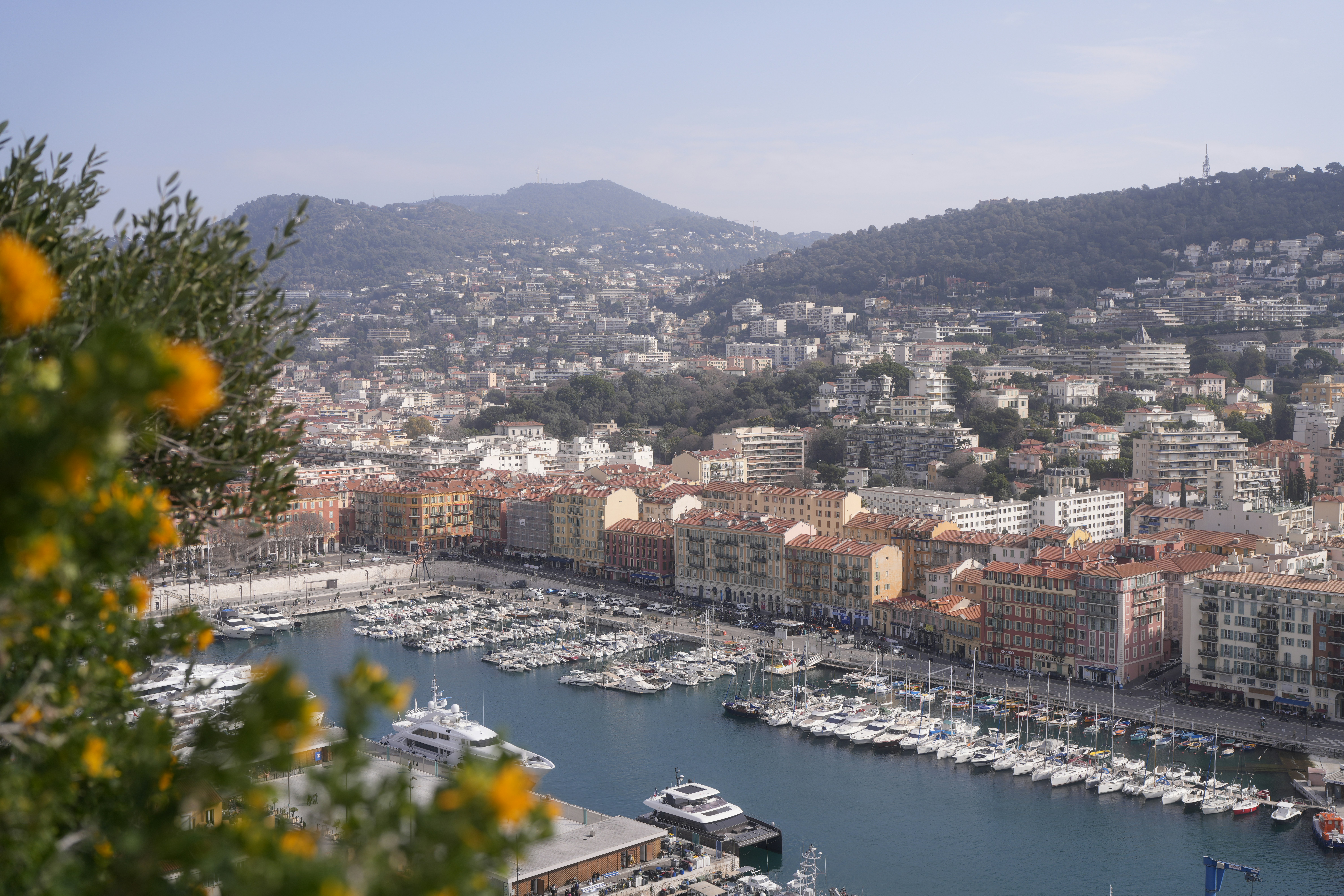 Harbor Framing: Coastline City Between Boats and Hills