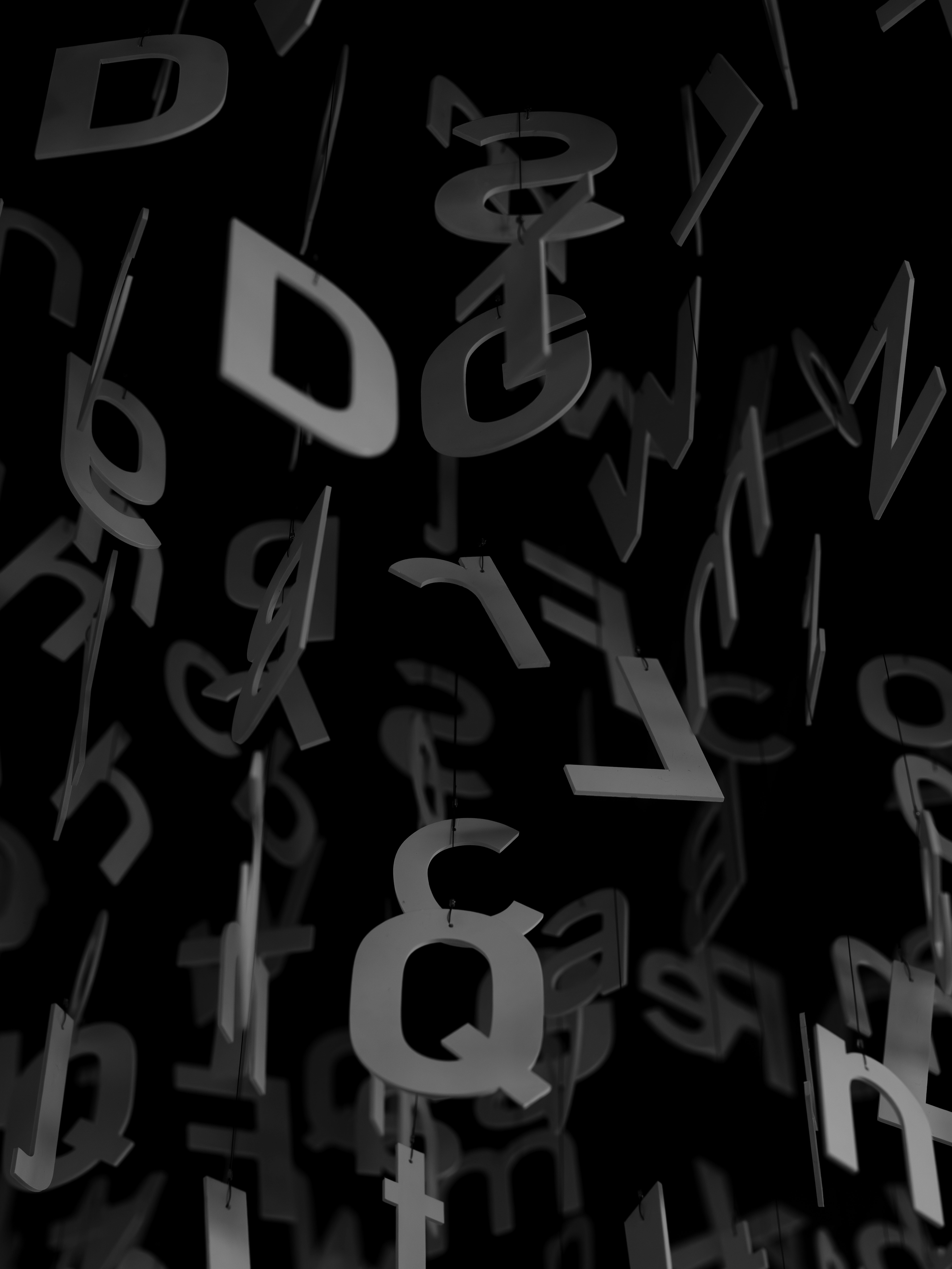 Letters in Flight: A Fragmented Dance of Typography