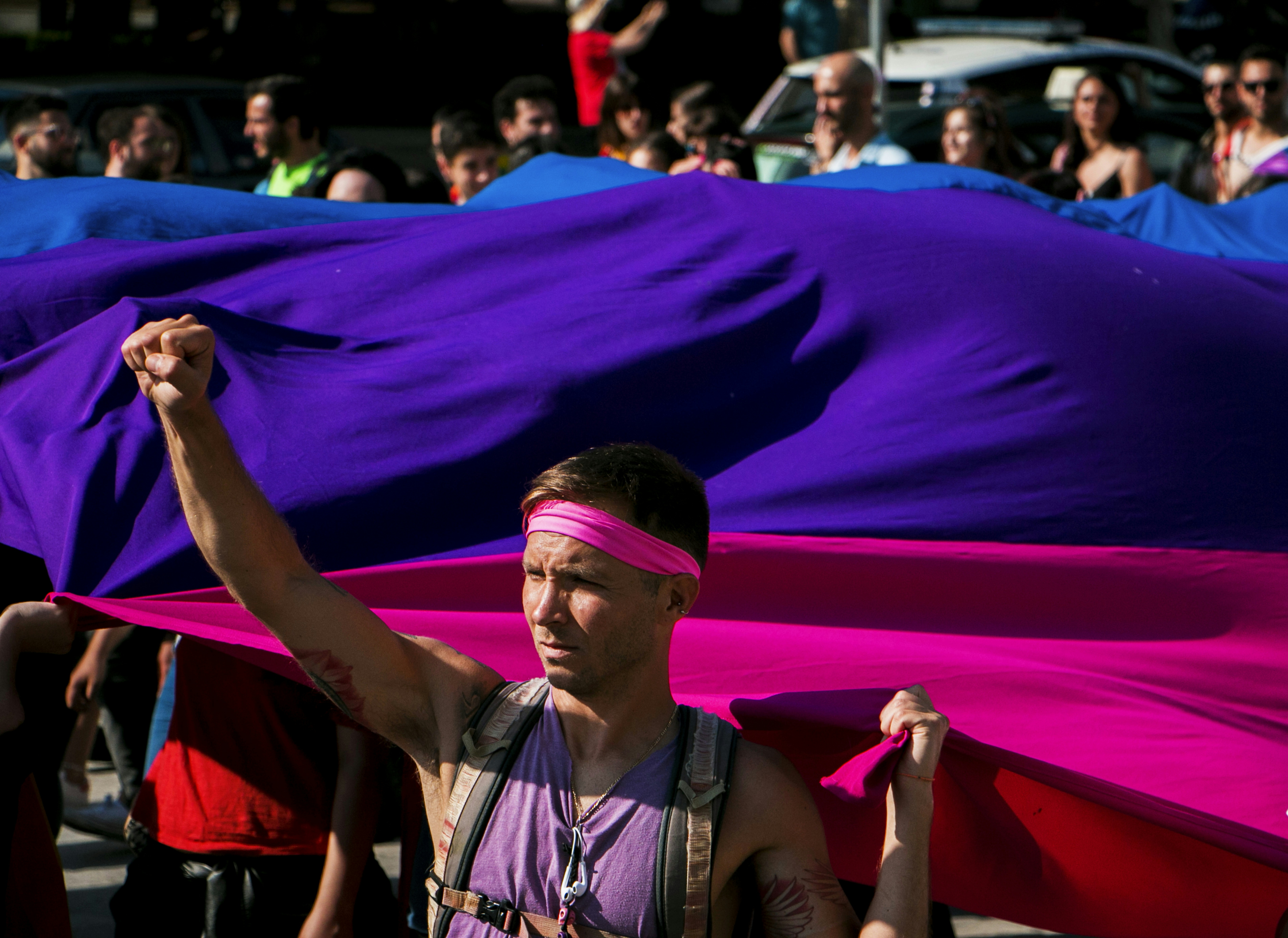 Rallying Colors: A Pride Banner Frame Surges Through the Crowd