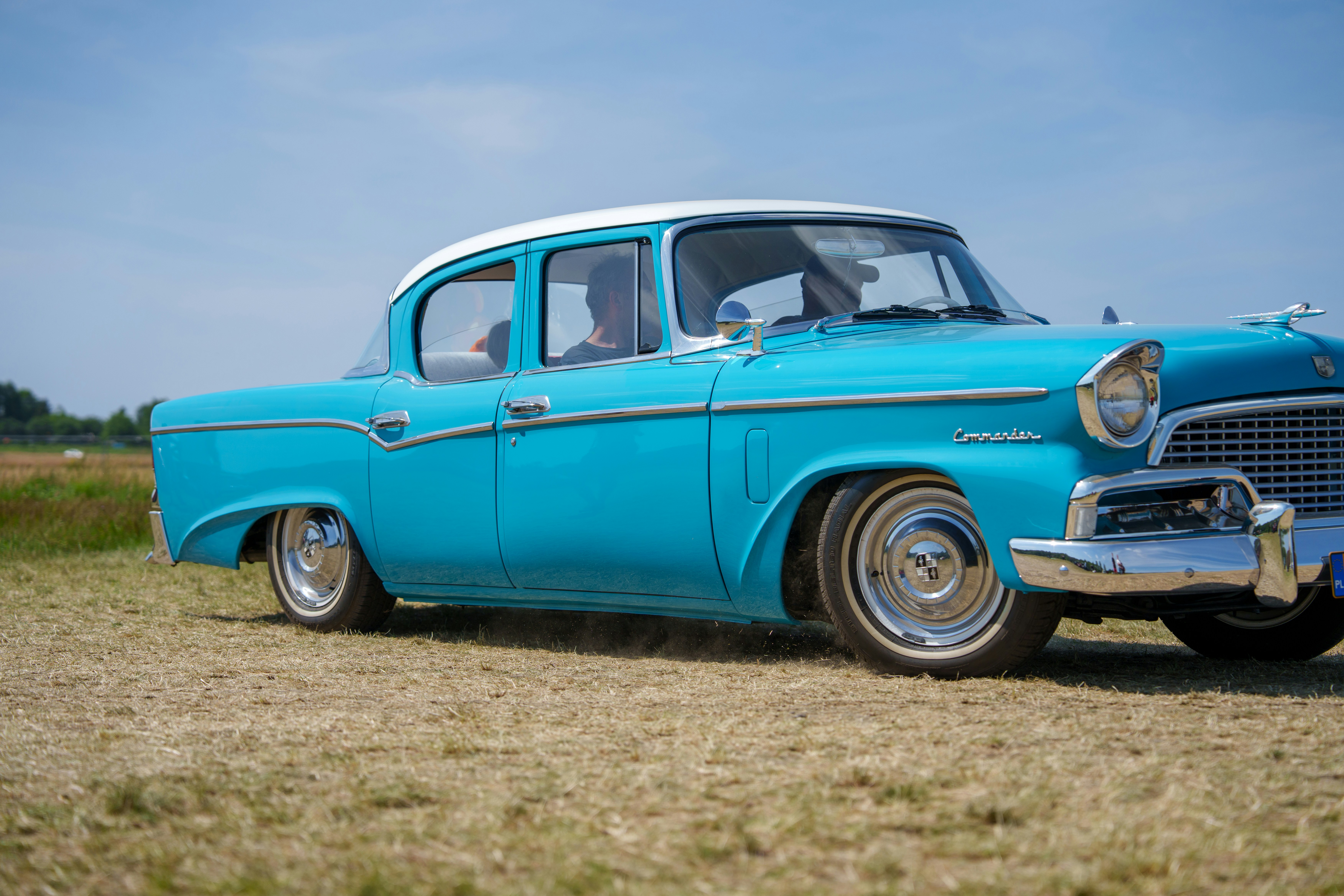 Azure Classic: A Vintage Chevrolet Rests Under Wide-Open Skies