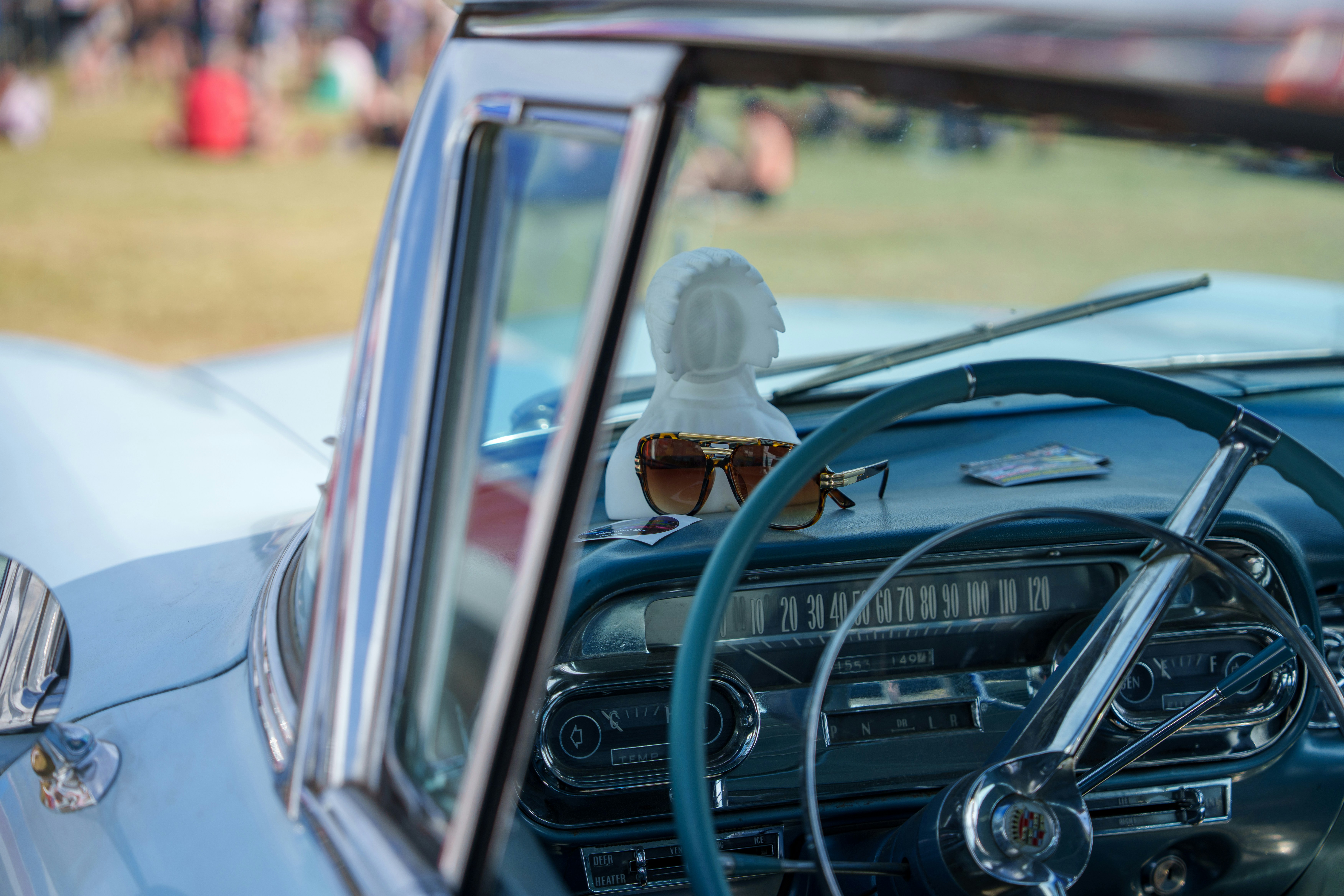 Pastel Dash: A vintage car’s chrome and cockpit glow